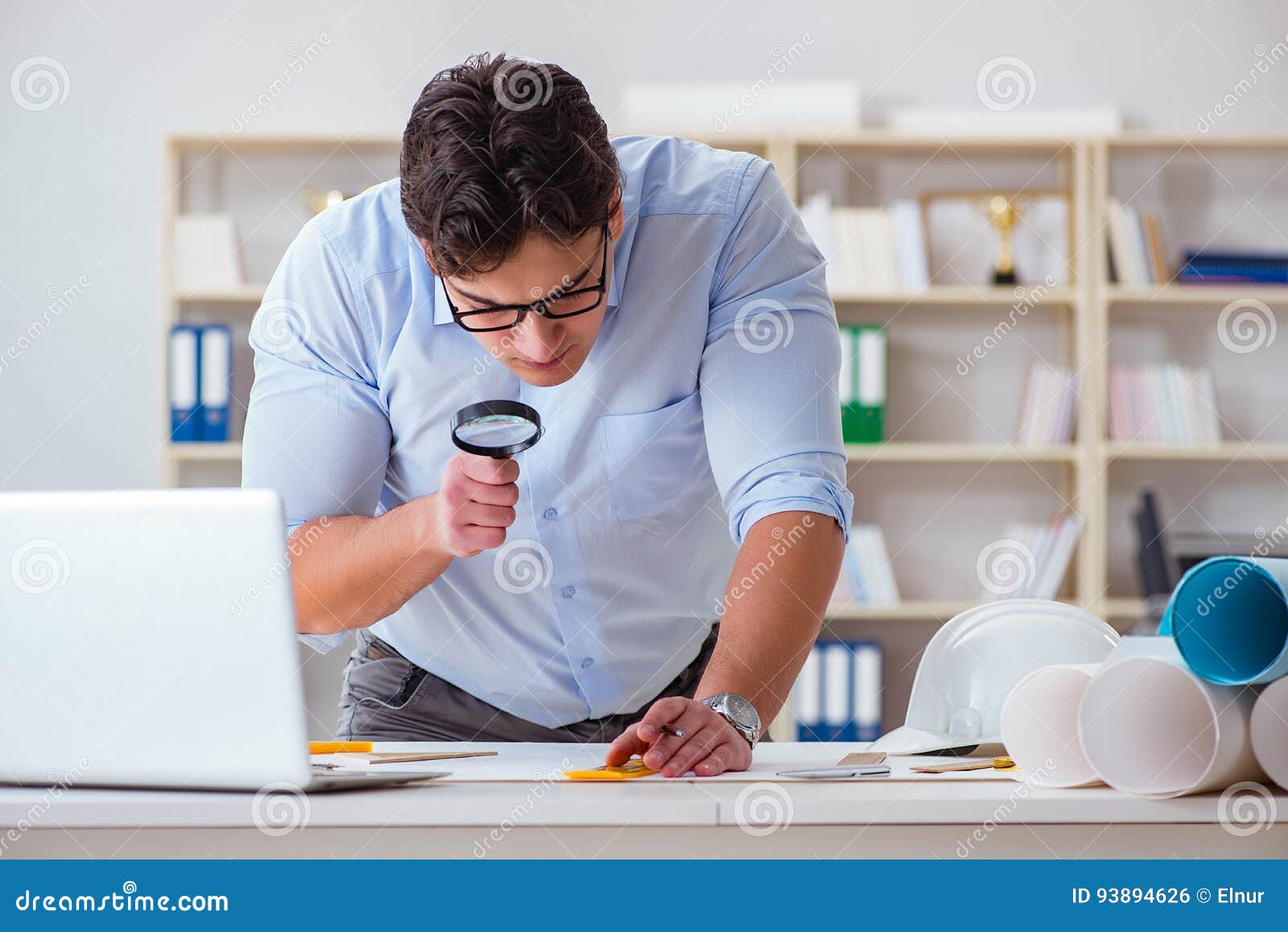 The Male Engineer Working on Drawings and Blueprints Stock Photo ...