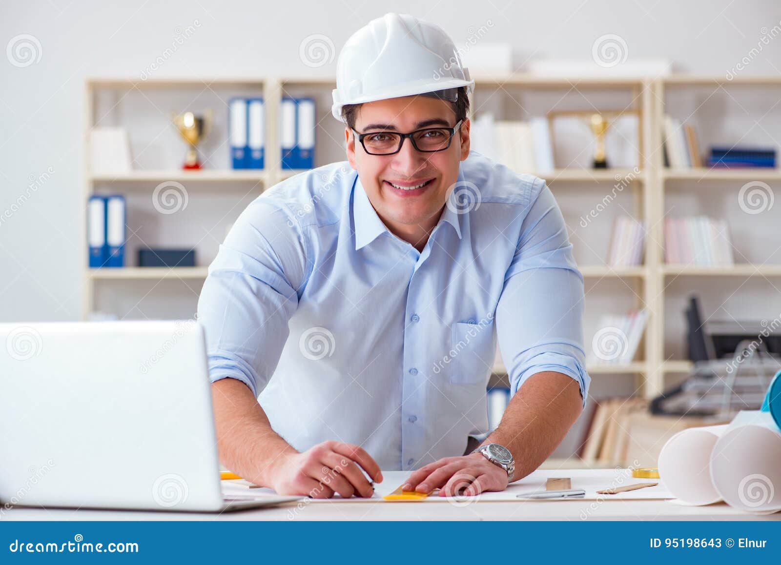 The Male Engineer Working on Drawings and Blueprints Stock Image ...