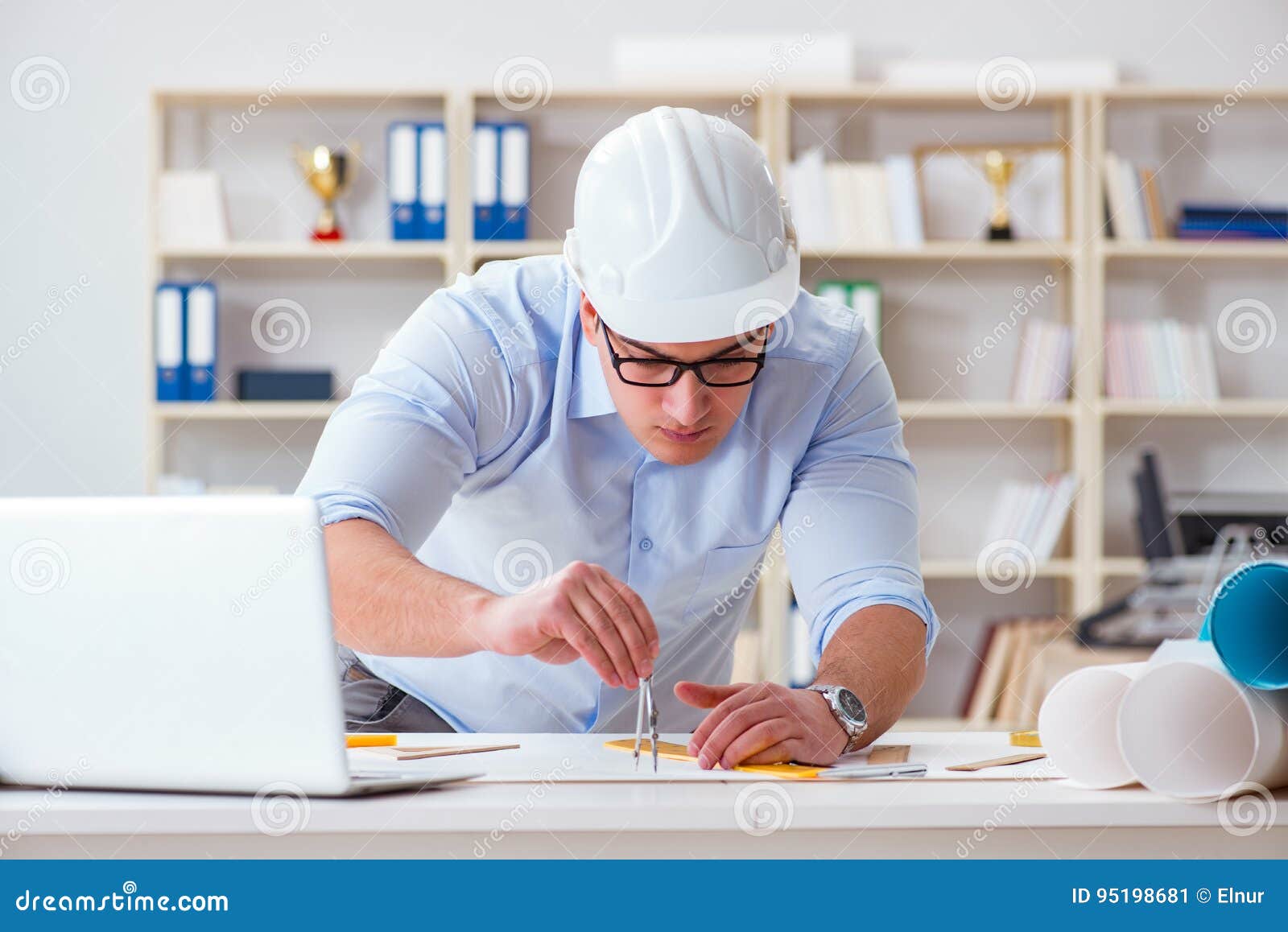 The Male Engineer Working on Drawings and Blueprints Stock Image ...