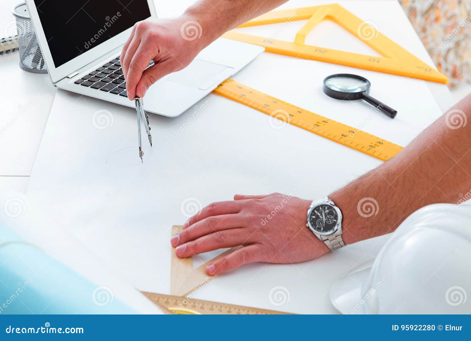 The Male Engineer Working on Drawings and Blueprints Stock Photo ...