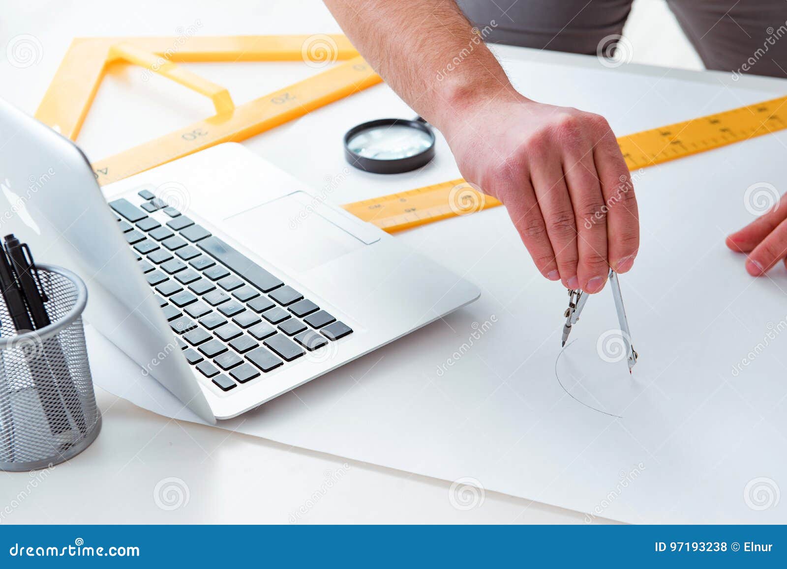 The Male Engineer Working on Drawings and Blueprints Stock Photo ...