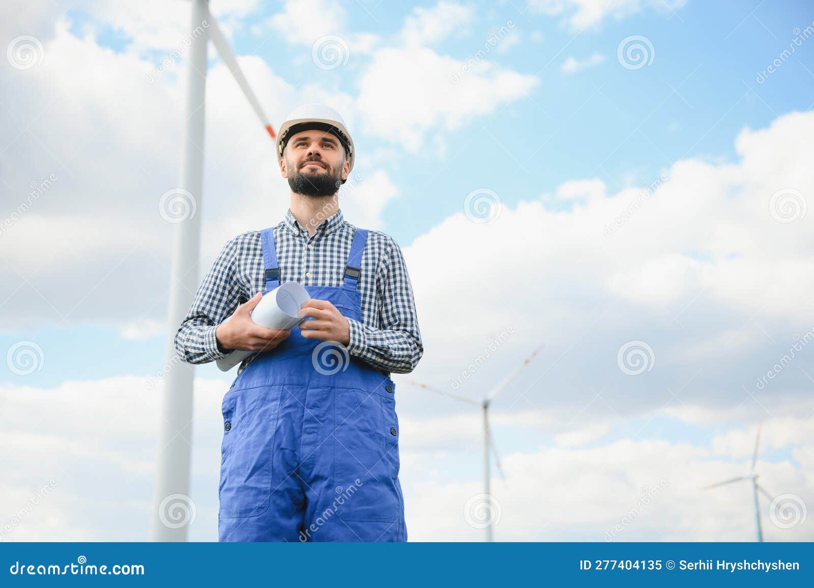 Male Engineer Working with Plan Inspecting or Maintenance of Wind ...