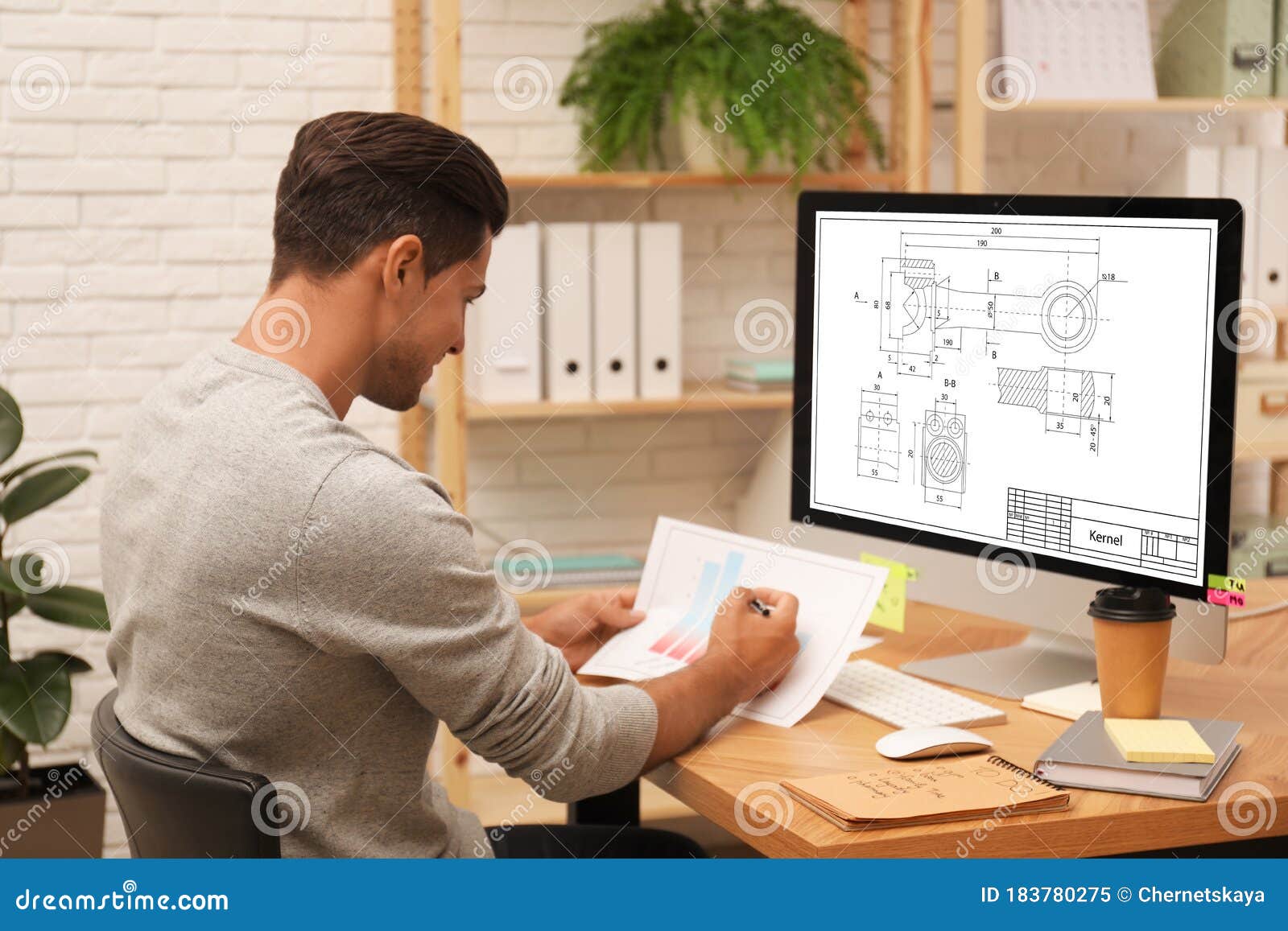 Male Engineer Working with Technical Drawing on Computer Stock Image ...