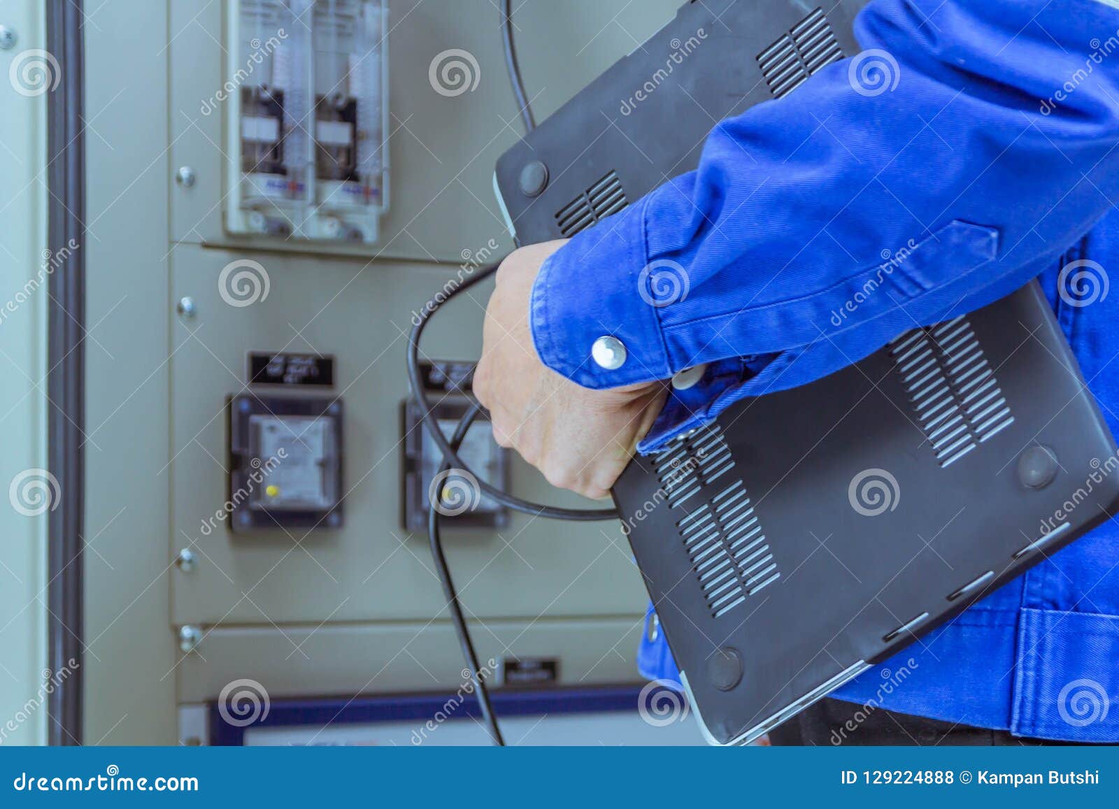 Male Engineers are Checking the Electrical System by Program in Stock ...