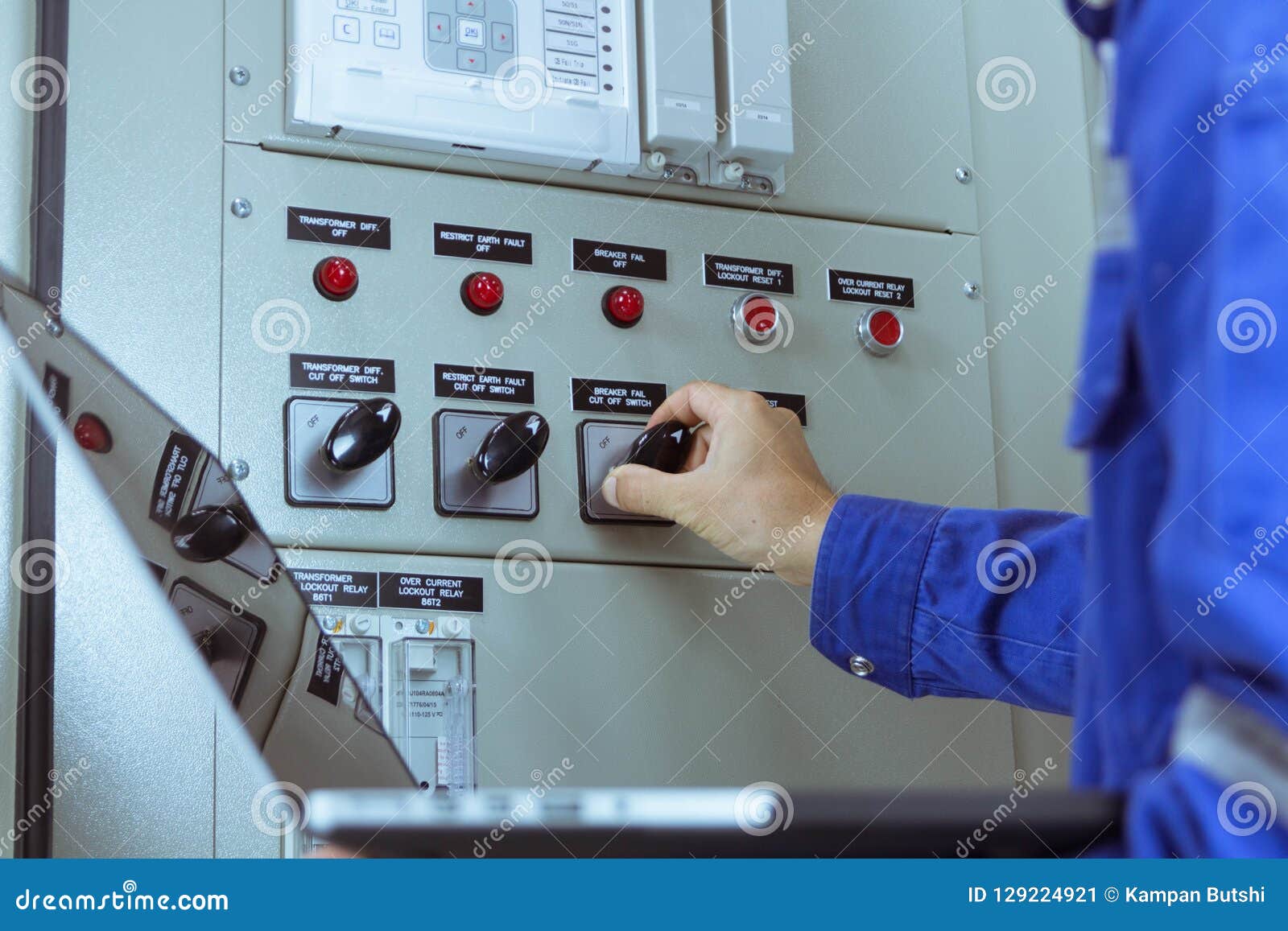 Male Engineers are Checking the Electrical System by Program in Stock ...