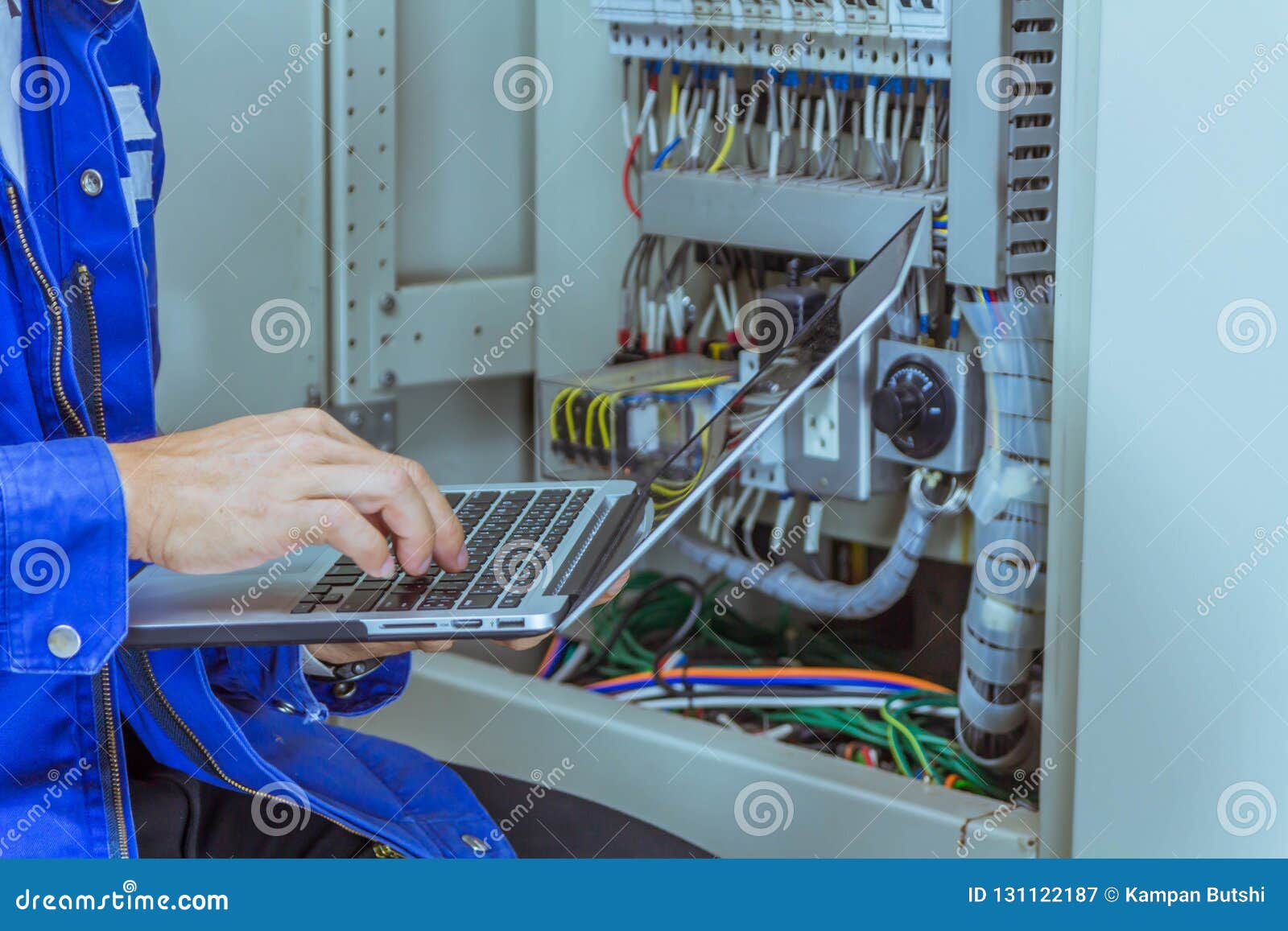 Male Engineers are Checking the Electrical System by Program in Stock ...