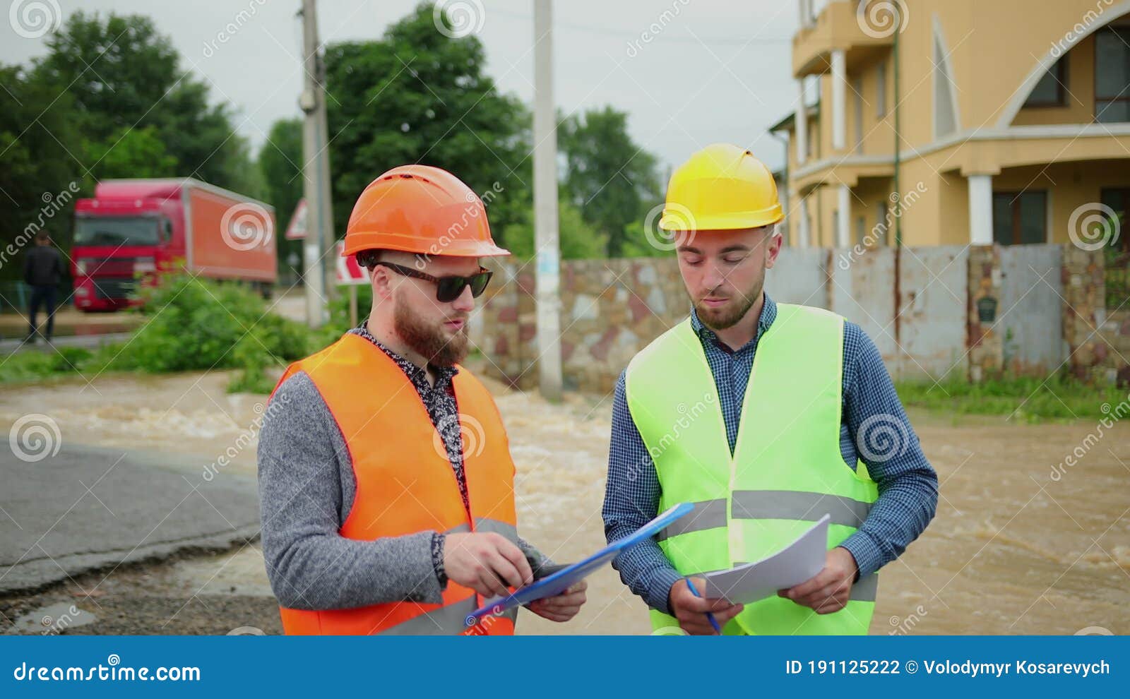 Male Engineers Solve Flood Problem. Devastation Wrought after Massive ...