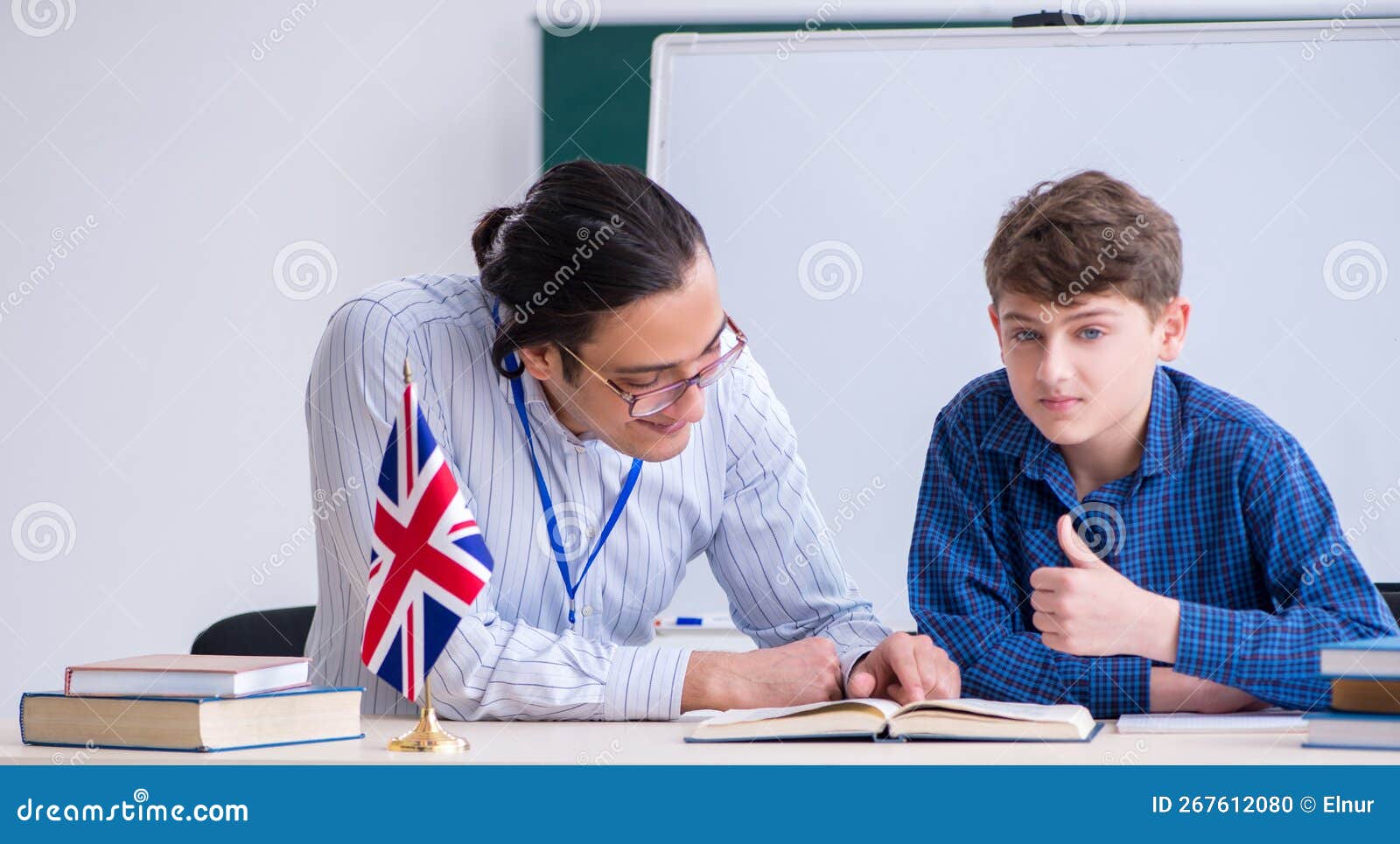 Male English Teacher and Boy in the Classroom Stock Photo - Image of ...