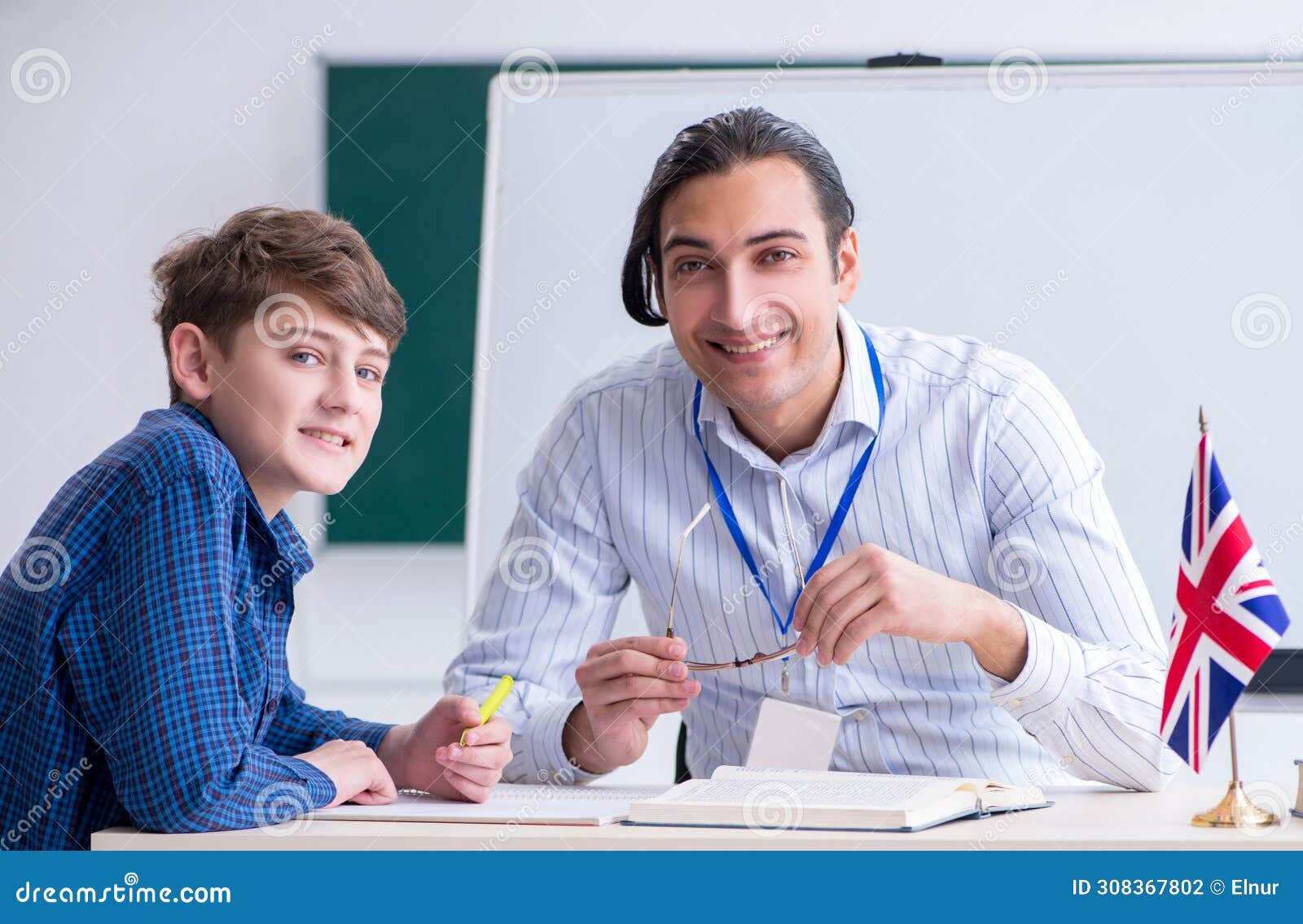 Male English Teacher and Boy in the Classroom Stock Photo - Image of ...
