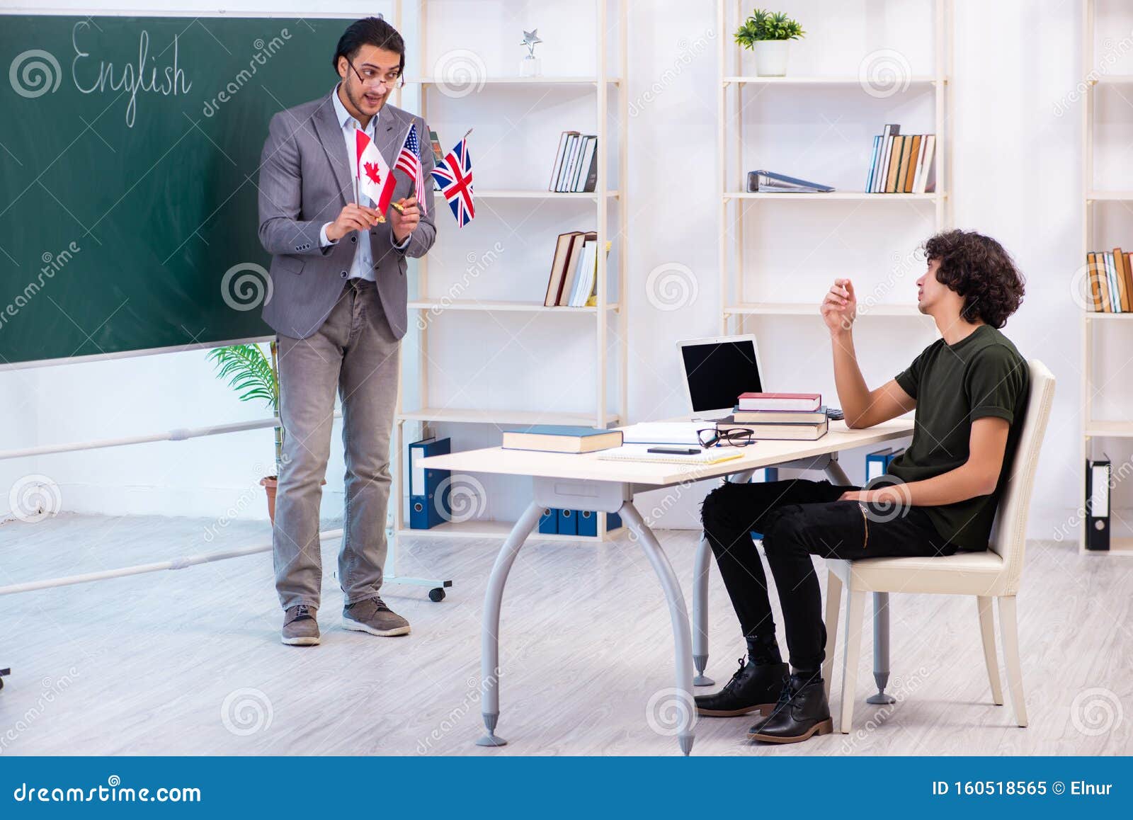 Male English Teacher and Student in the Classroom Stock Image - Image ...