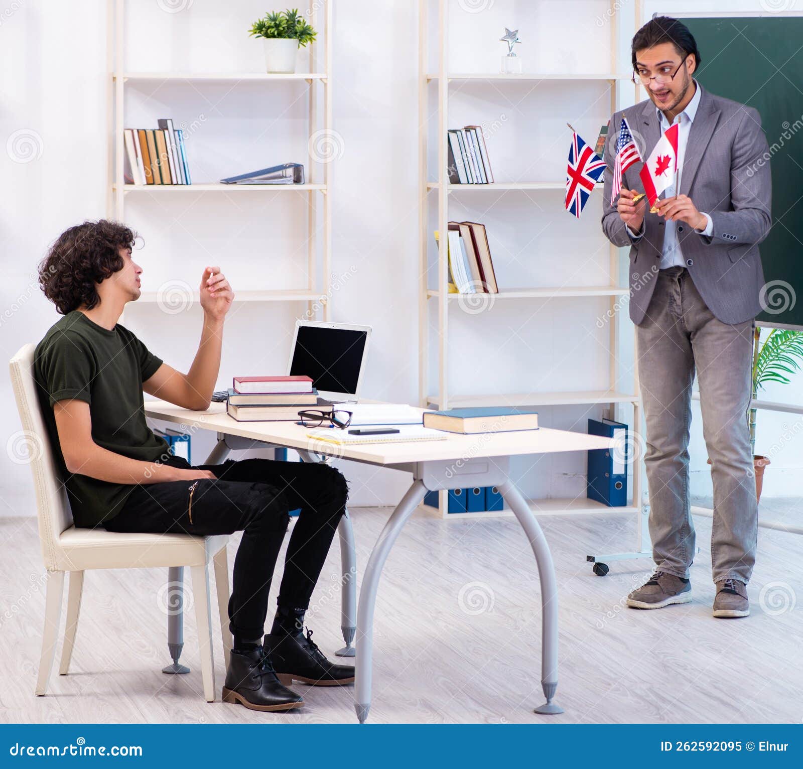Male English Teacher and Student in the Classroom Stock Image - Image ...