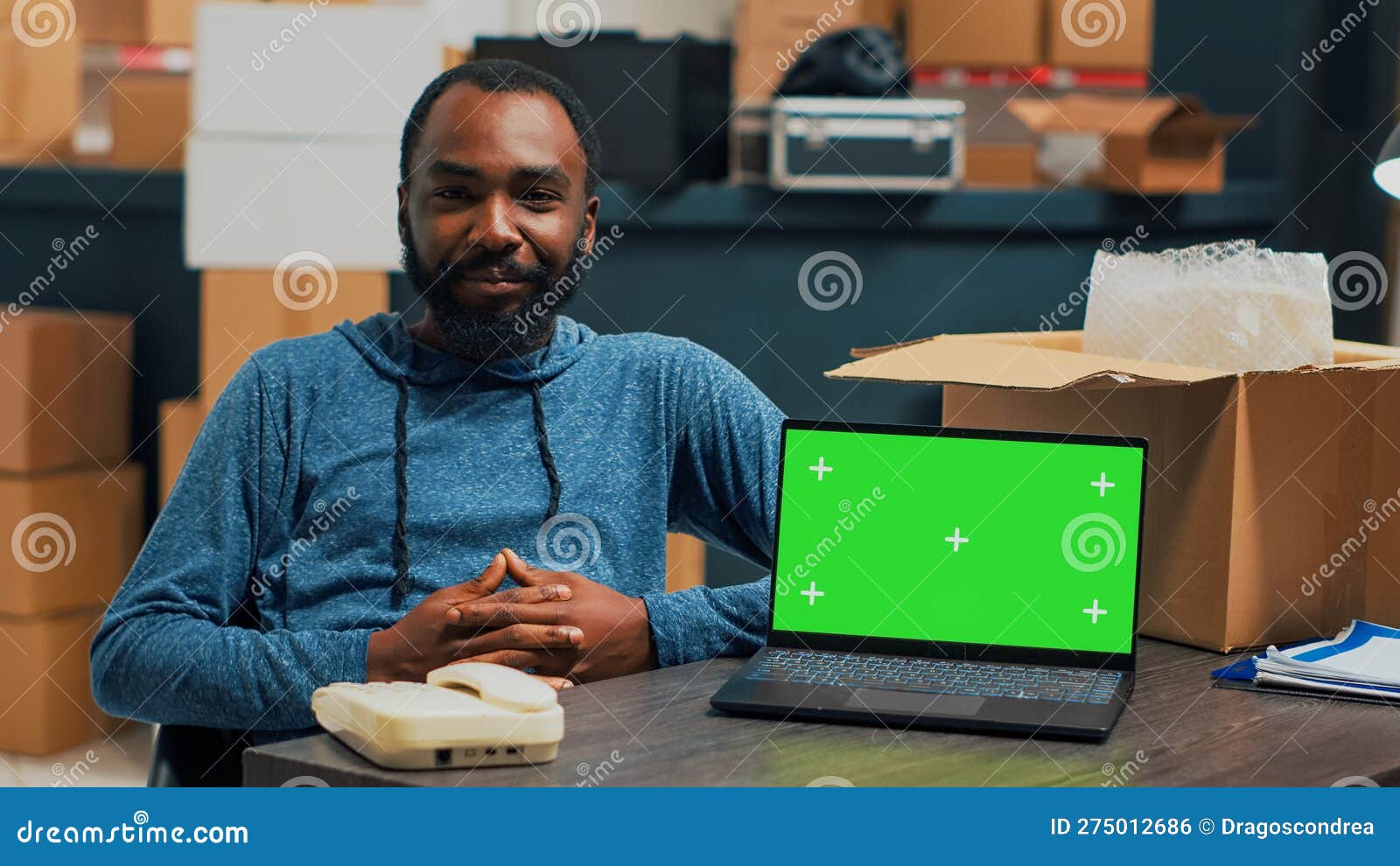 Male Entrepreneur Smiling and Working with Greenscreen on Display Stock ...