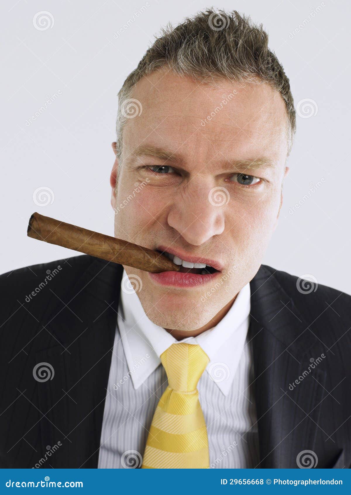 Male Entrepreneur Smoking Cigar Stock Photo - Image of cigar, confident ...