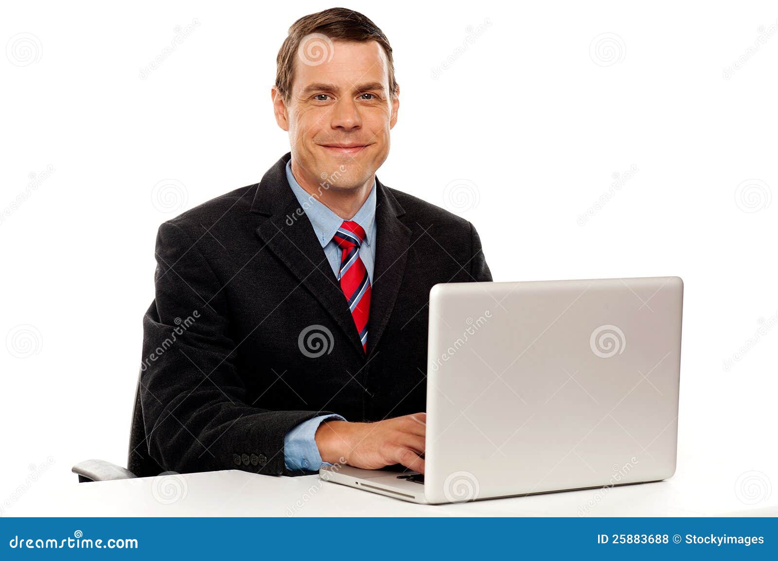 Male Executive at Work Desk Operating Laptop Stock Photo - Image of ...