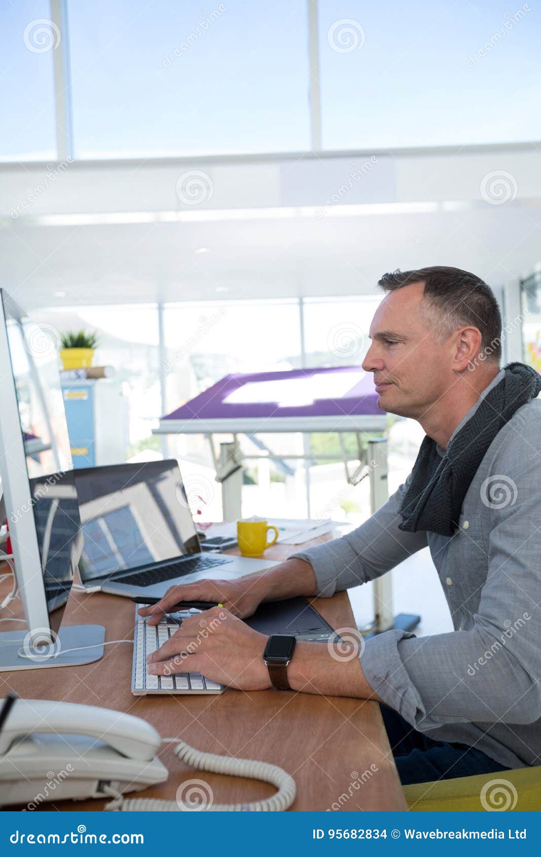 Male Executive Working at Desk in the Office Stock Photo - Image of ...