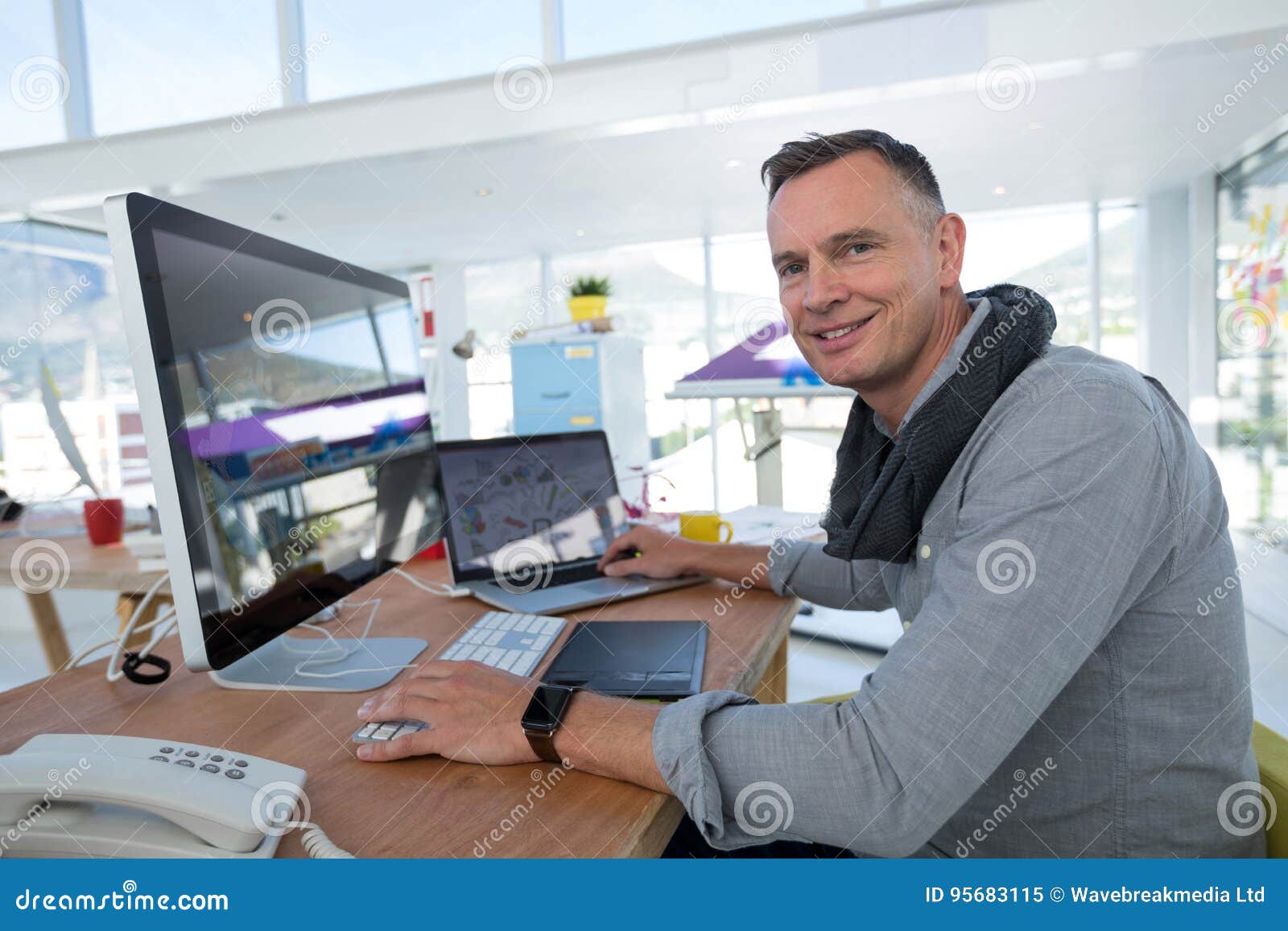 Male Executive Working at Desk in the Office Stock Image - Image of ...