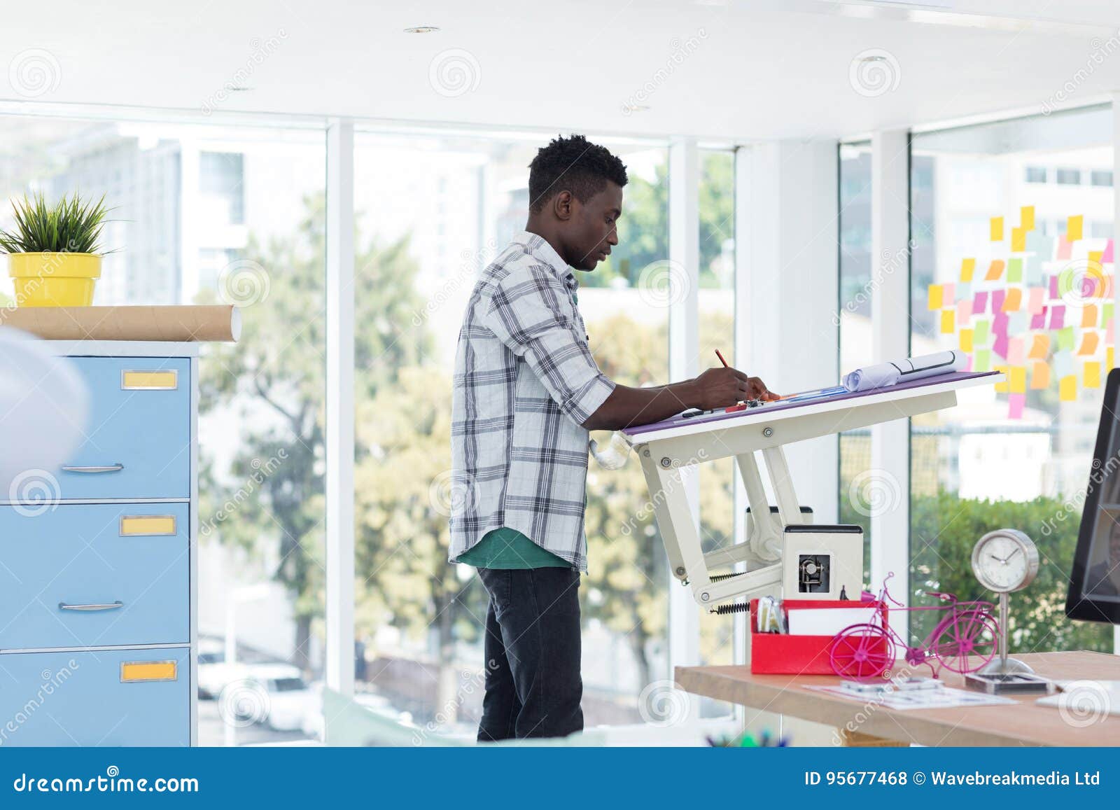 Male Executive Working Over Drafting Table Stock Photo - Image of ...