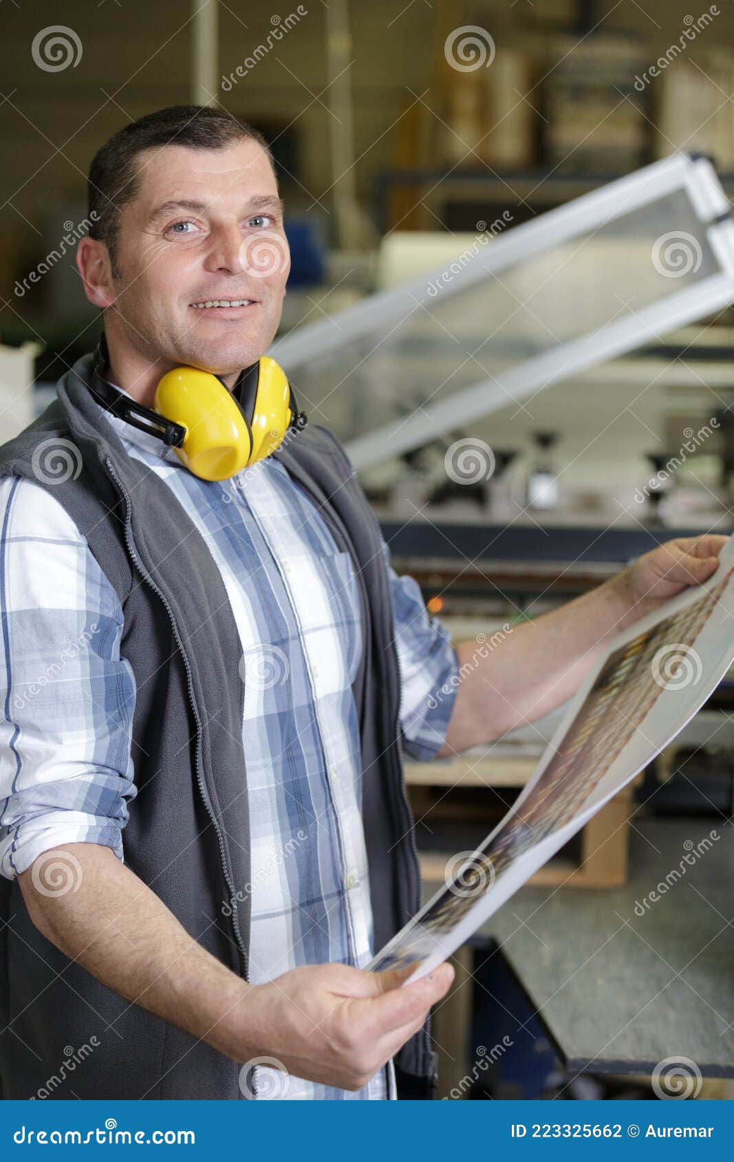 Male Factory Worker Holding Paperwork Stock Photo - Image of work ...