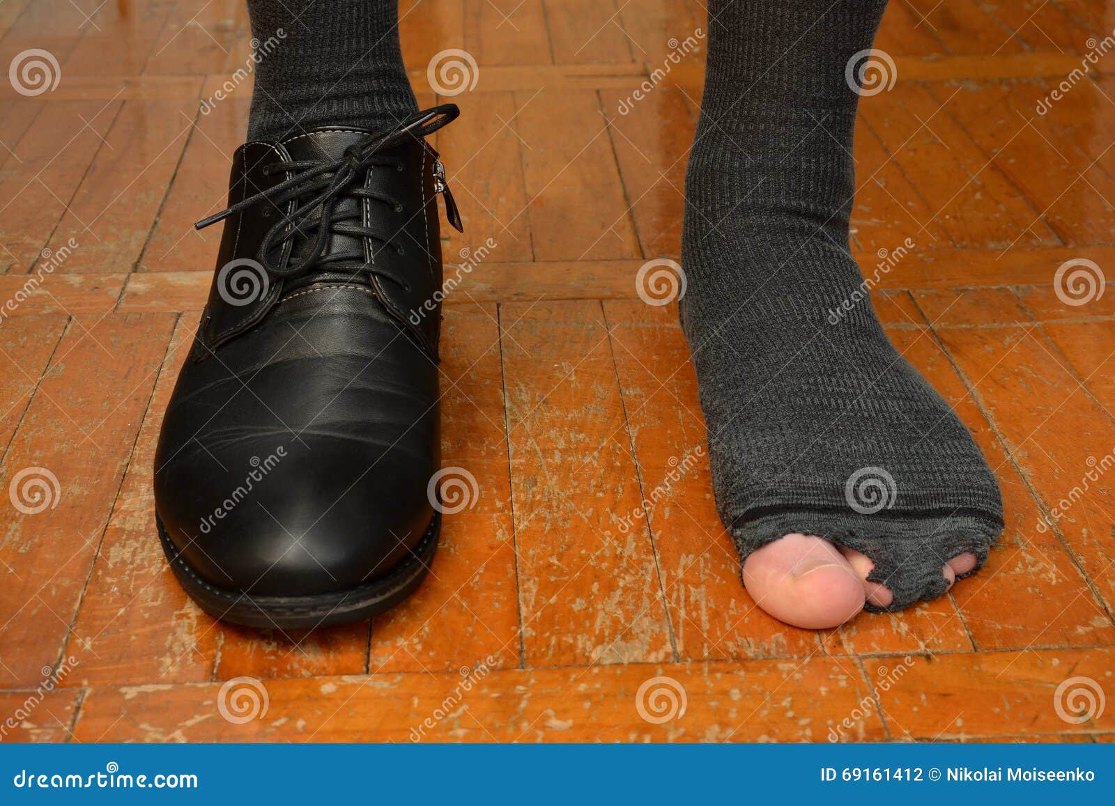 Male Feet in One Shoe and Torn Socks on White Background Stock Photo ...