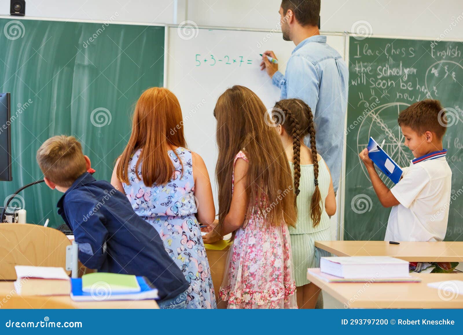 Students Learning Mathematics with Teacher in Classroom Stock Photo ...