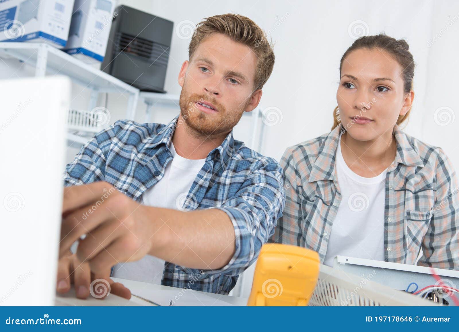Male and female engineers stock photo. Image of person - 197178646