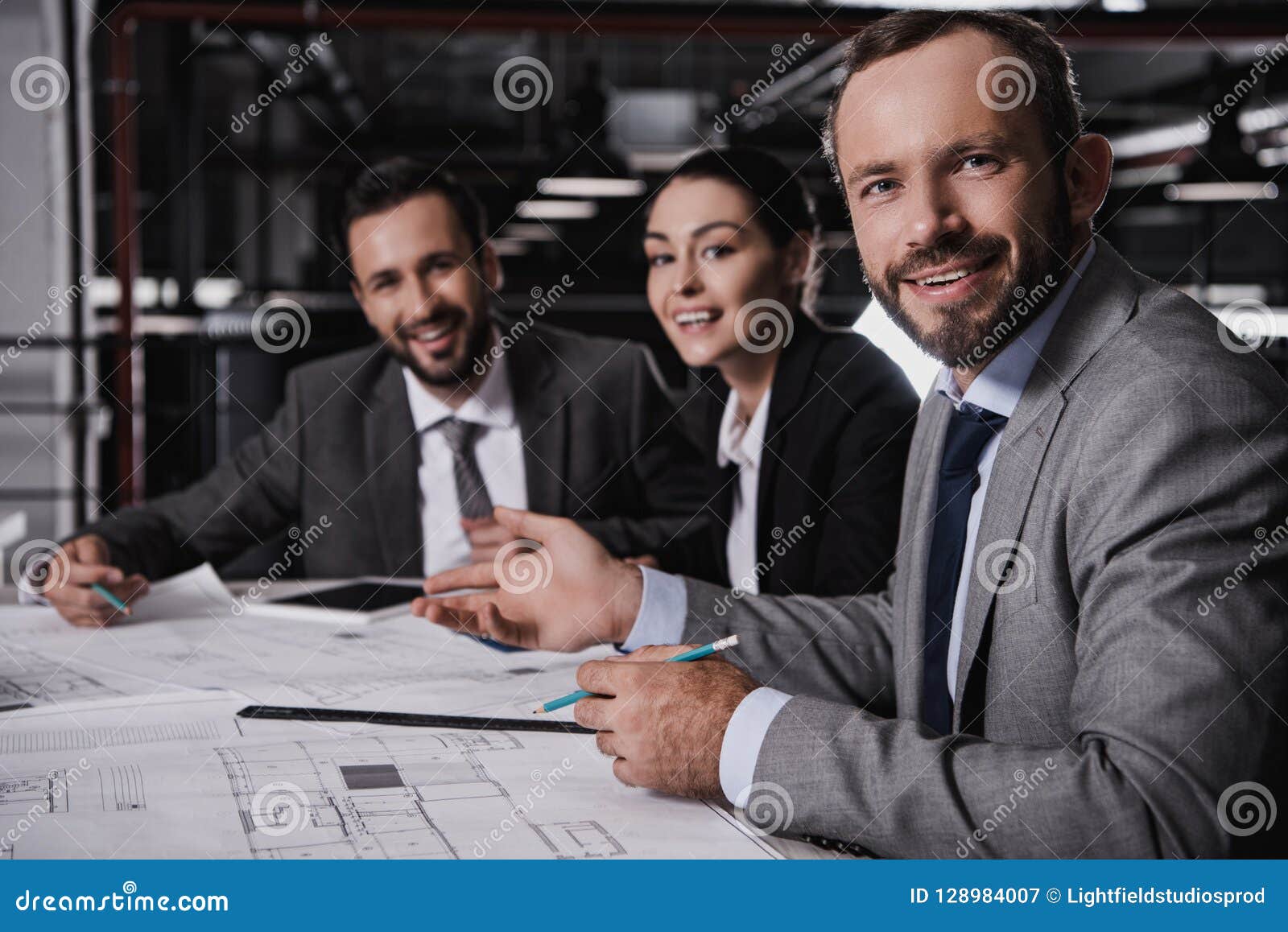 Male and Female Engineers in Suits Working Stock Image - Image of male ...