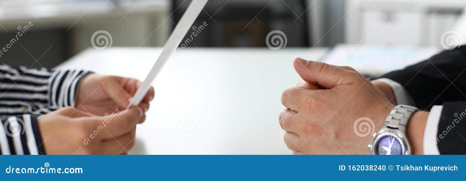 Male and Female Hands Lying on Opposite Side of Table Communicating ...