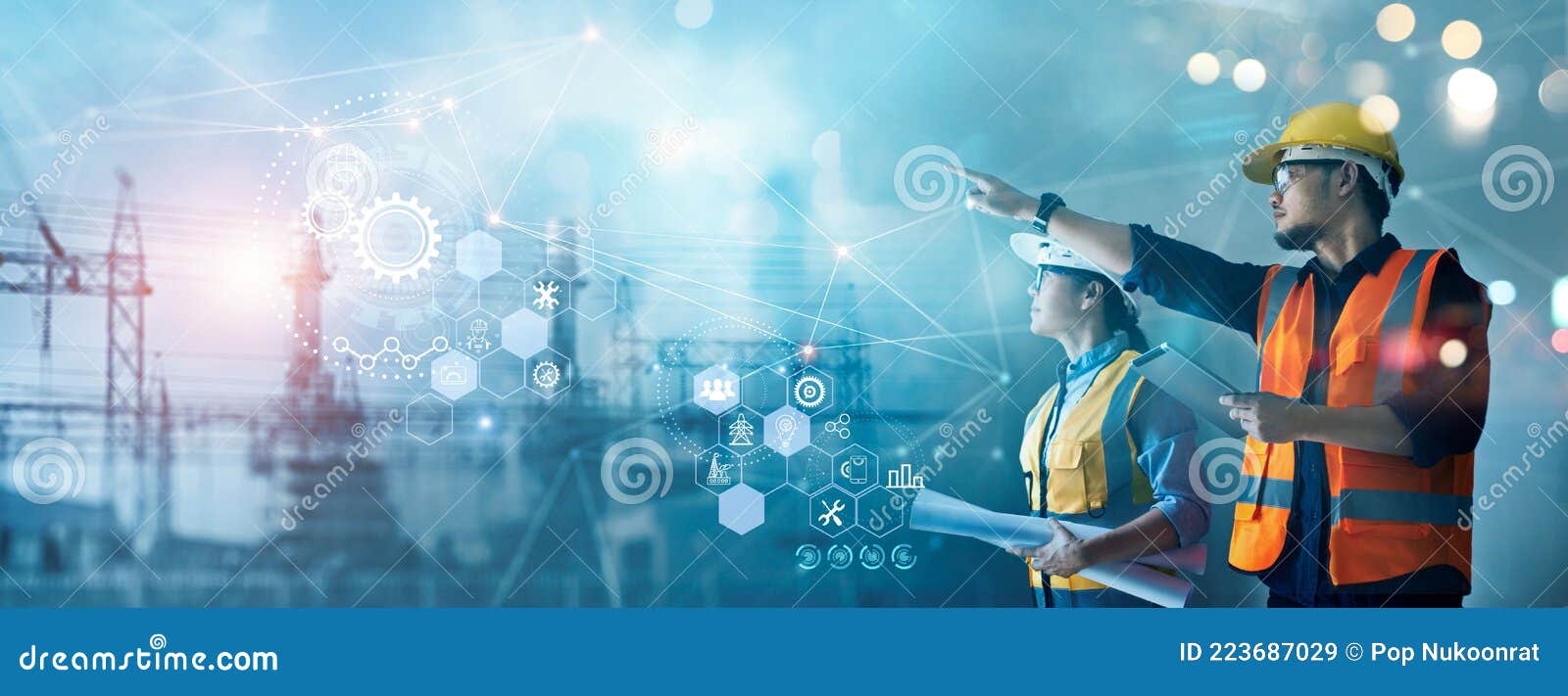 Male and Female Industrial Engineers Using Tablet Computer and ...