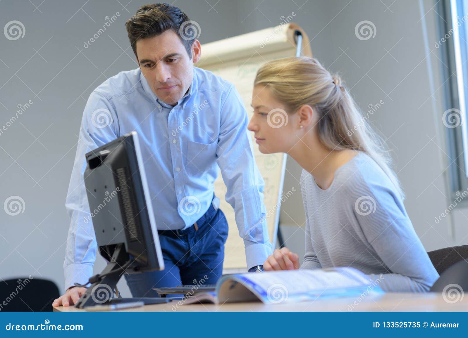 Male And Female It Programmers Testing New Software Application Stock