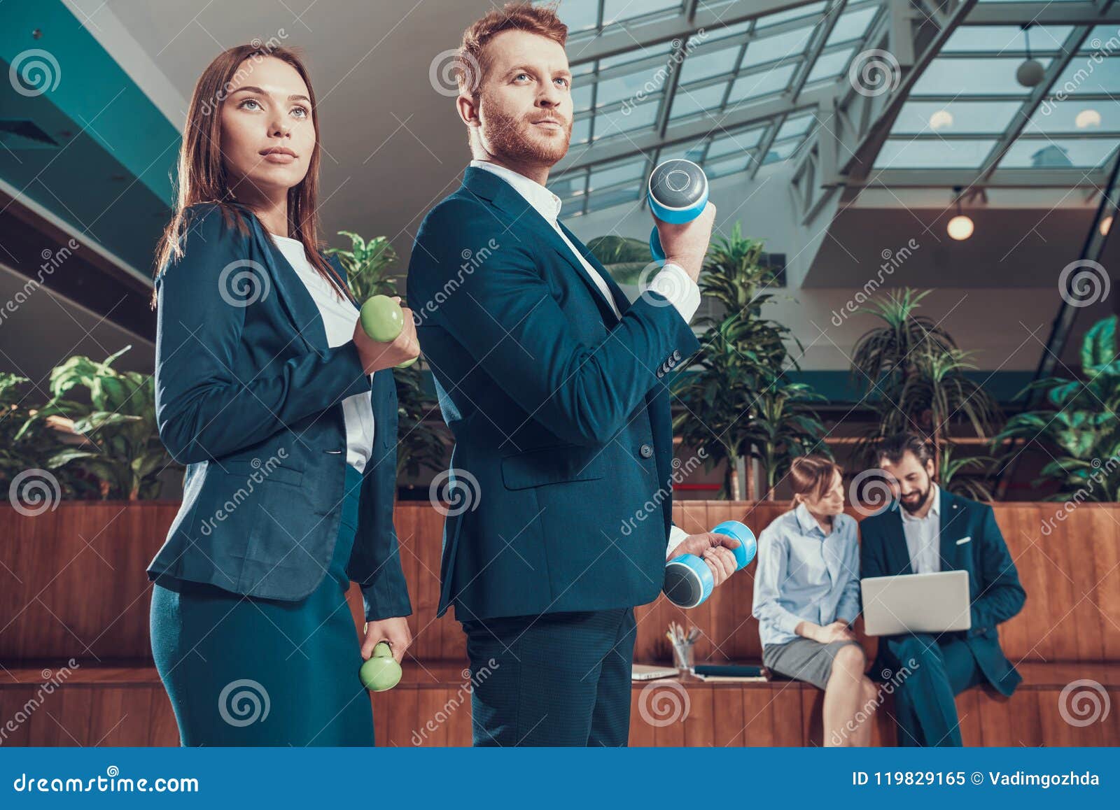 Workers Exercising on Bench in Office. Stock Image - Image of manager ...