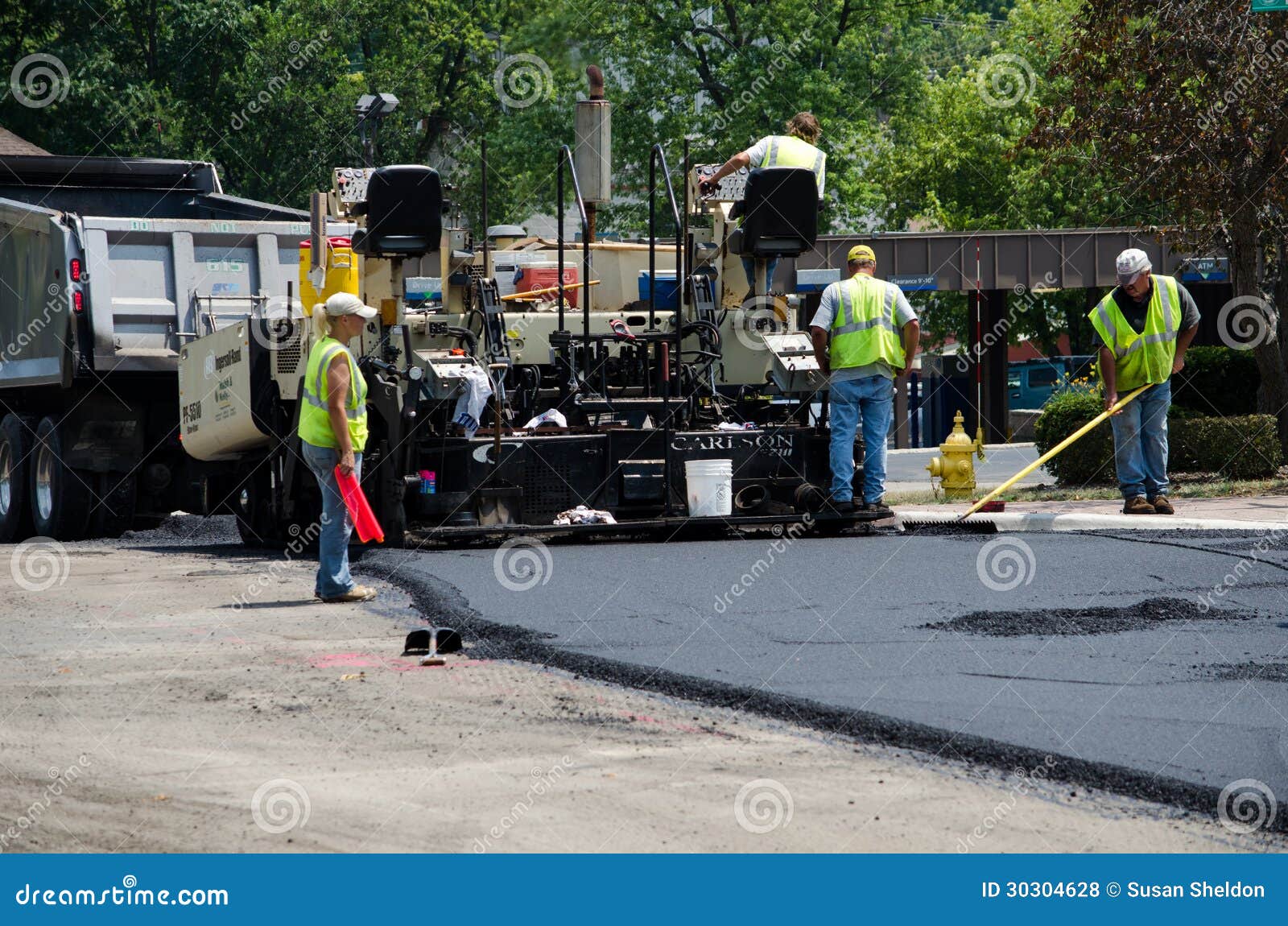Workers Repaving a road editorial stock photo. Image of equipment ...