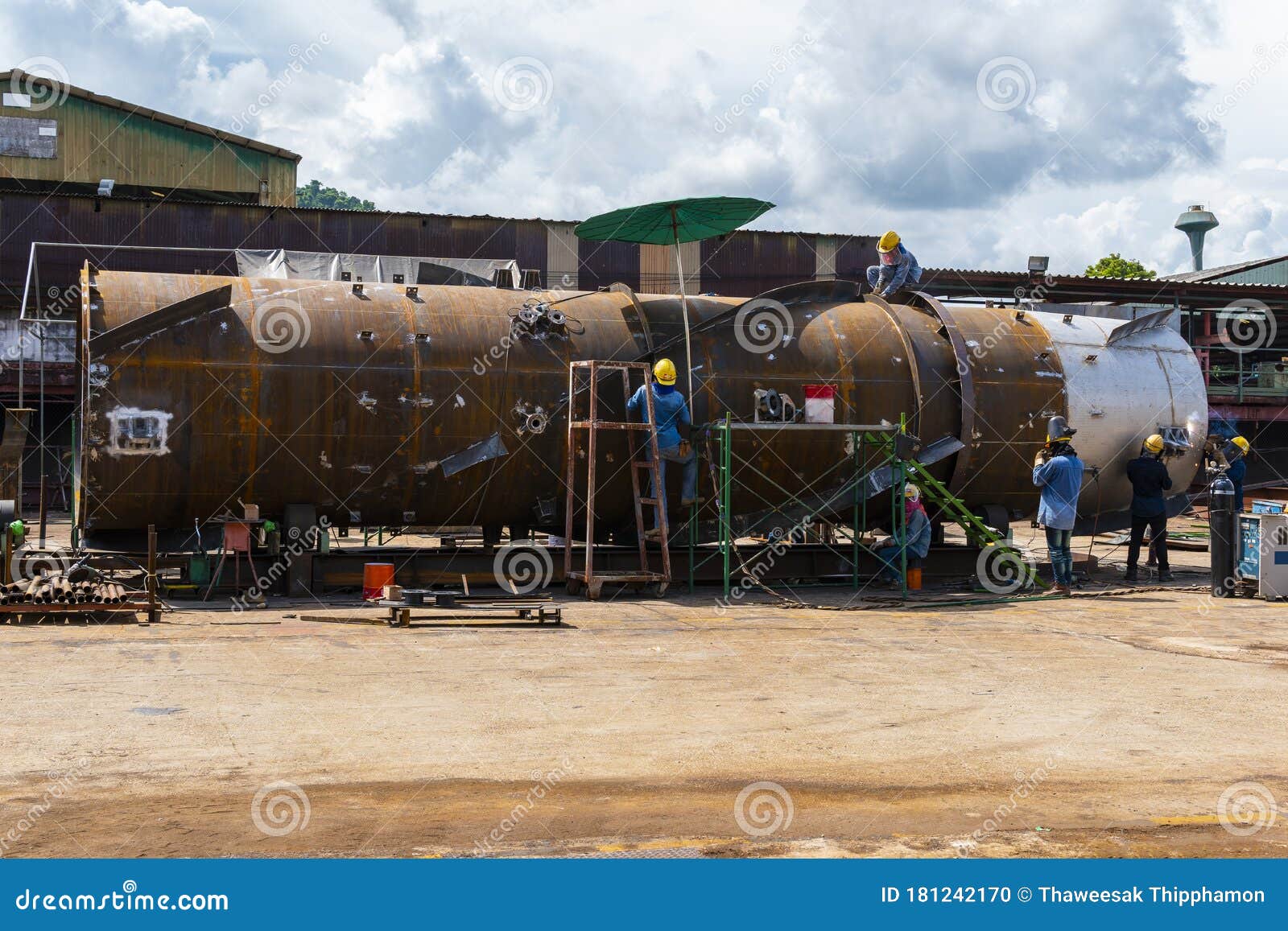 Workers are Helping To Fix the Defects of the Welding Work and Damage ...