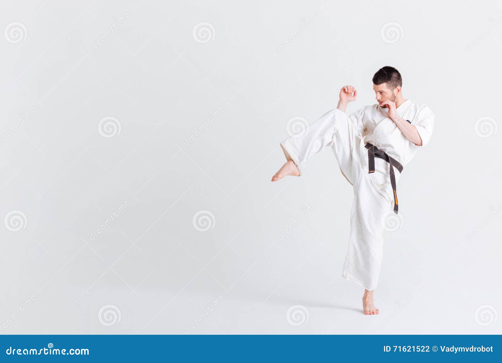 Male fighter in kimono stock photo. Image of pose, black - 71621522