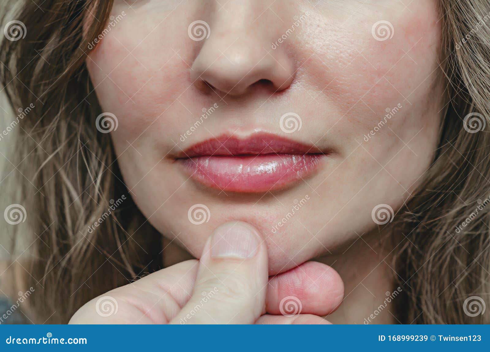 Male Finger On The Female Chin Below The Lips Hand Holds Chin Stock
