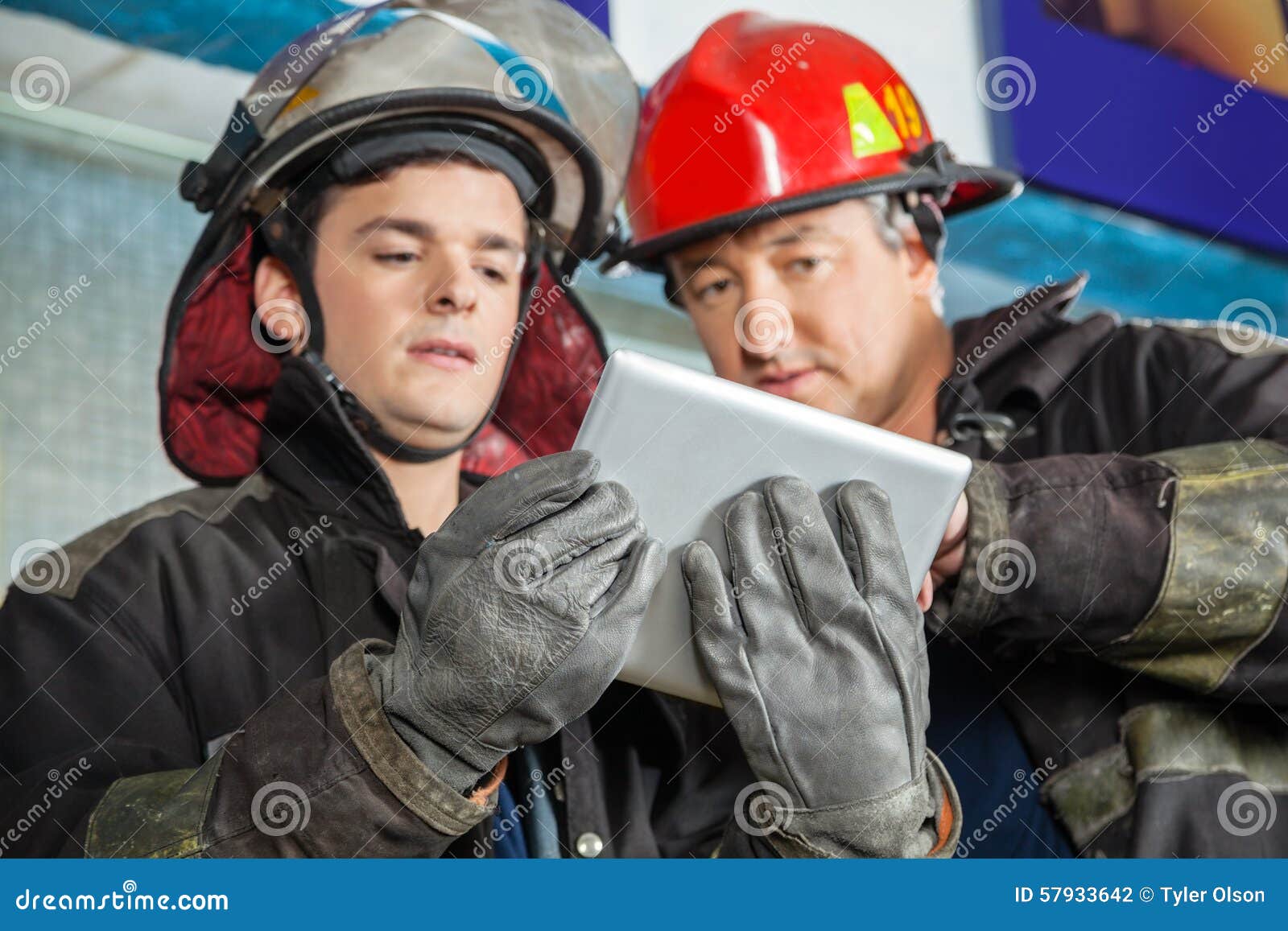 Male Firefighters Using Digital Tablet at Fire Stock Photo - Image of ...