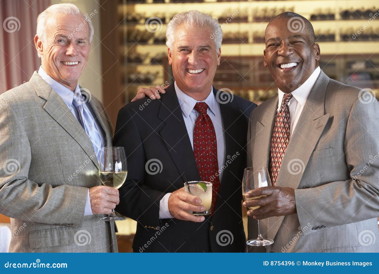 Male Friends Socializing at a Bar Stock Photo - Image of looking ...