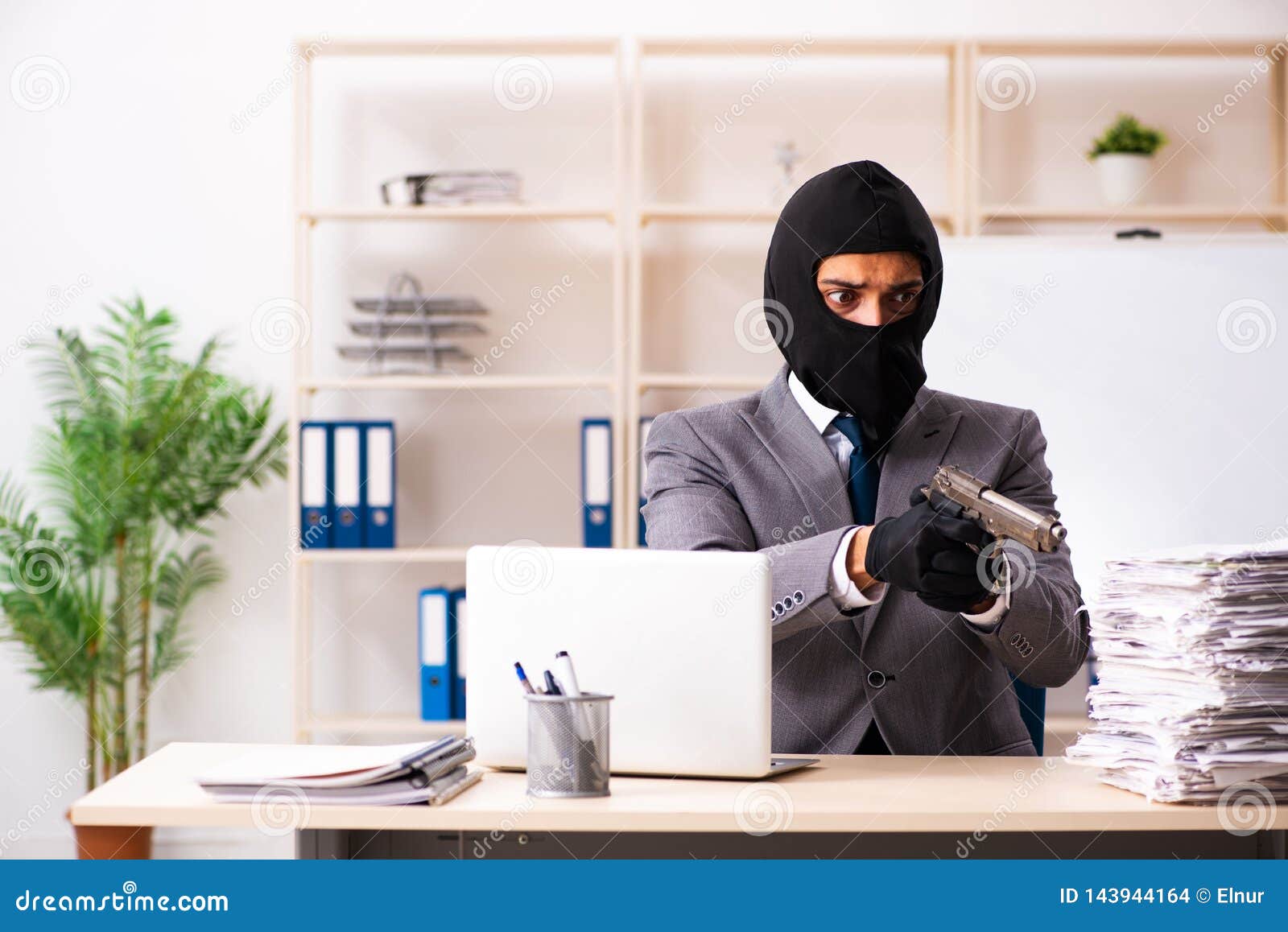 The Male Gangster Stealing Information from the Office Stock Photo ...