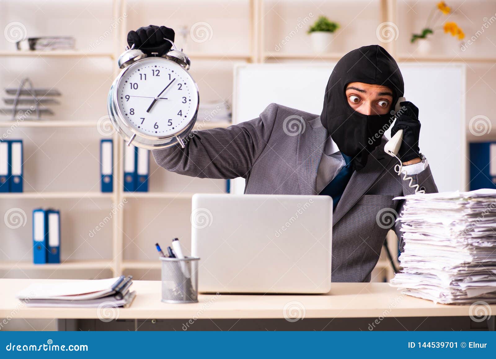 The Male Gangster Stealing Information from the Office Stock Image ...