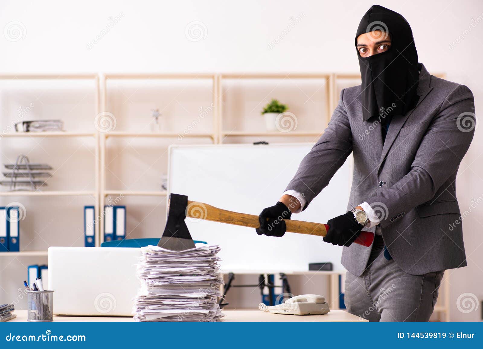 The Male Gangster Stealing Information from the Office Stock Image ...