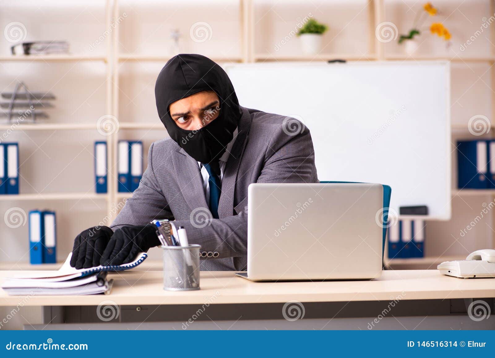 The Male Gangster Stealing Information from the Office Stock Photo ...
