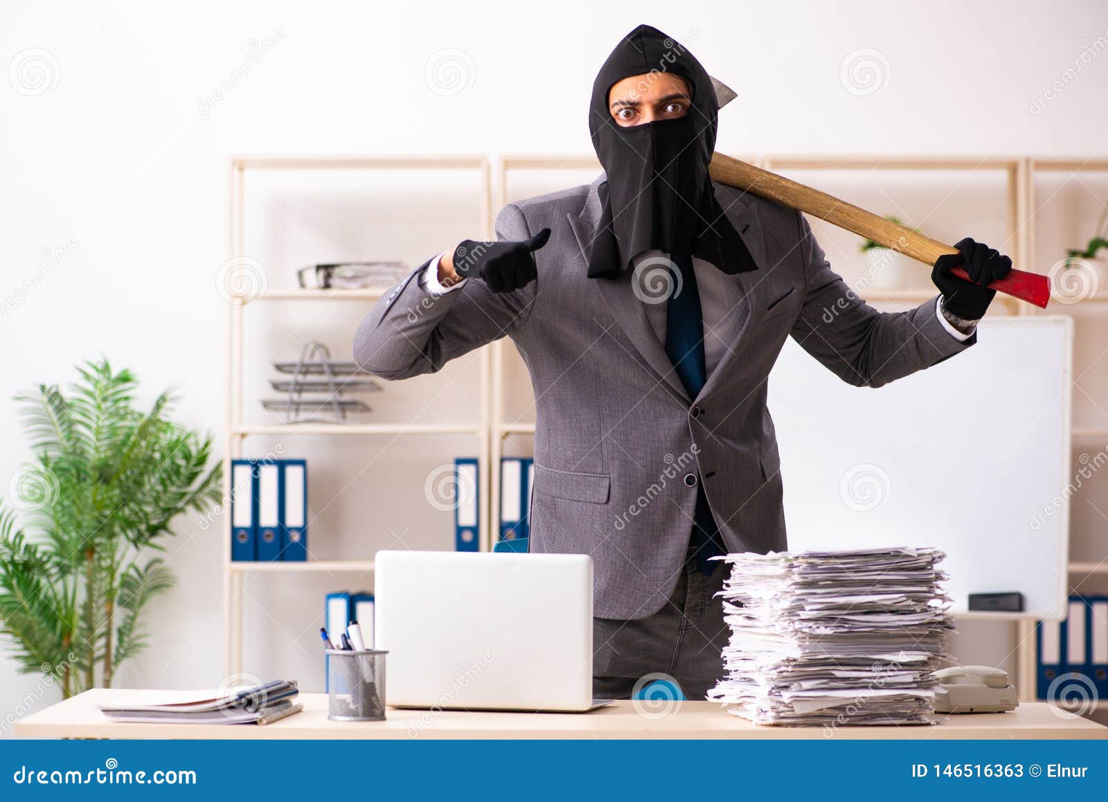 The Male Gangster Stealing Information from the Office Stock Image ...
