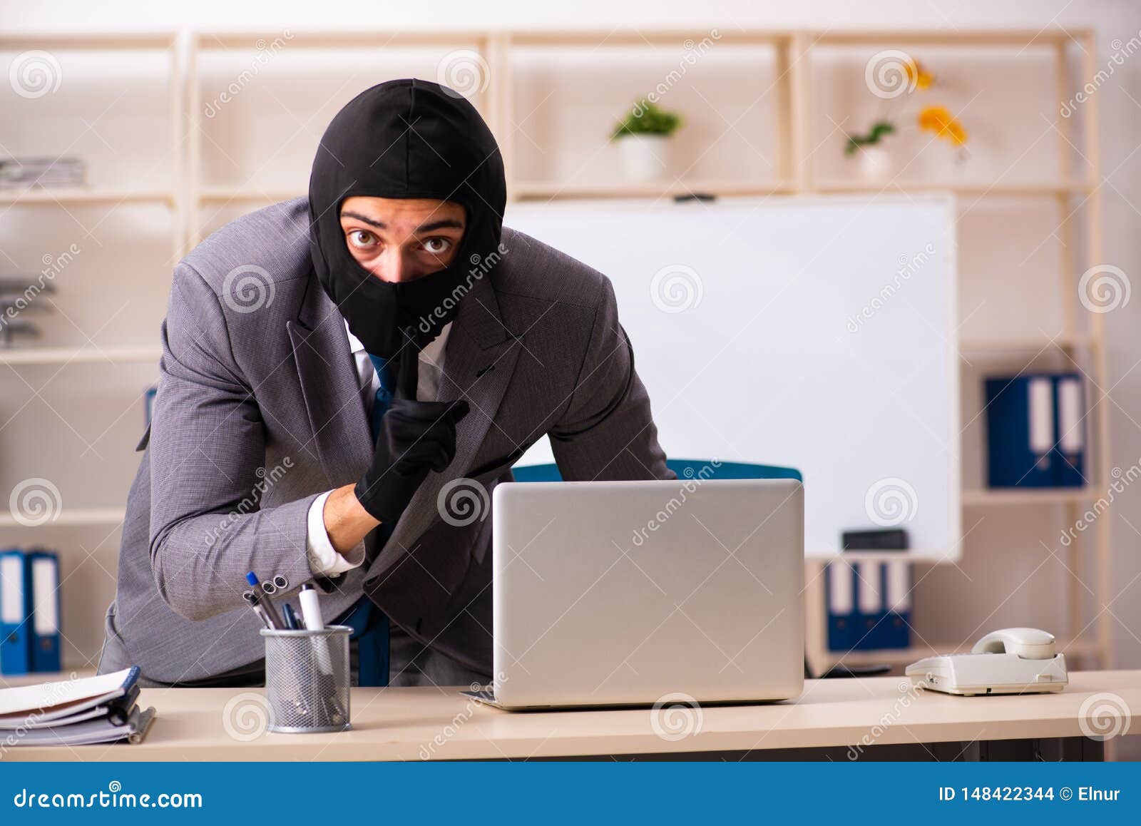 The Male Gangster Stealing Information from the Office Stock Photo ...