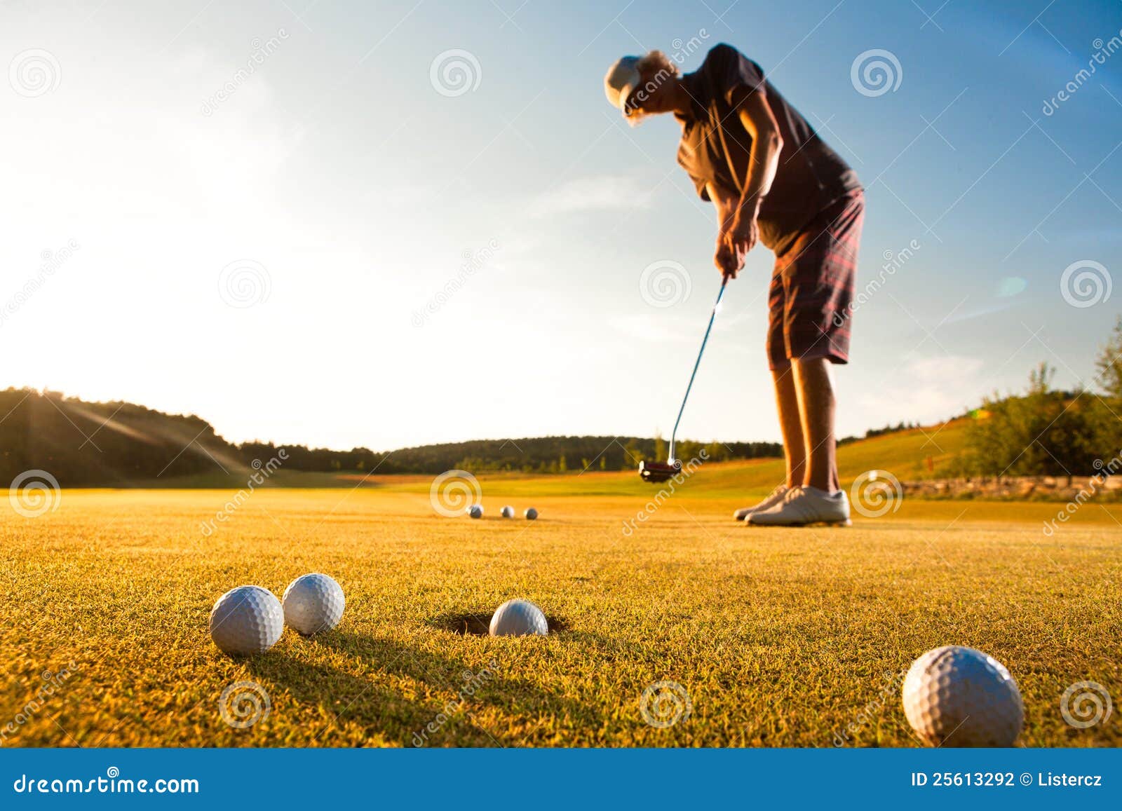 Male Golf Player Practicing a Par during Sunset Stock Photo - Image of ...