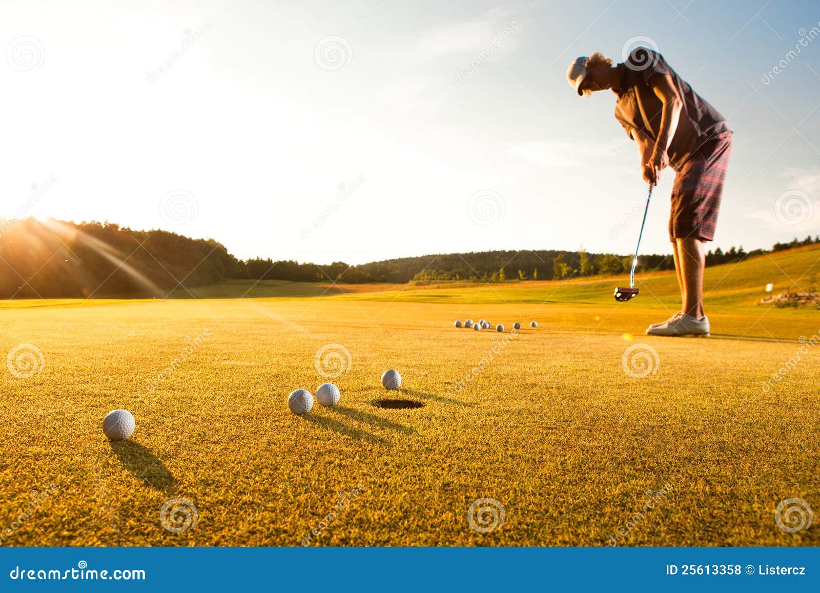 Male Golf Player Practicing a Par during Sunset Stock Photo - Image of ...