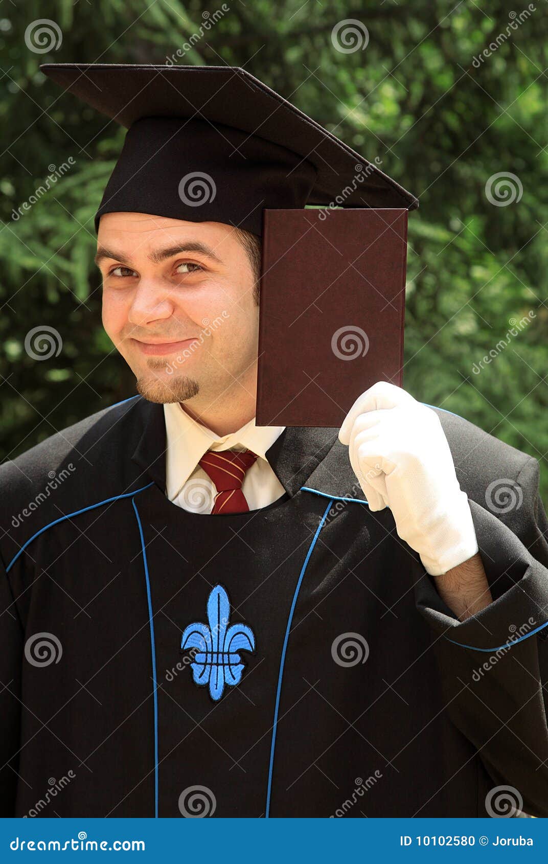 Male graduate stock photo. Image of outdoor, gown, diploma - 10102580