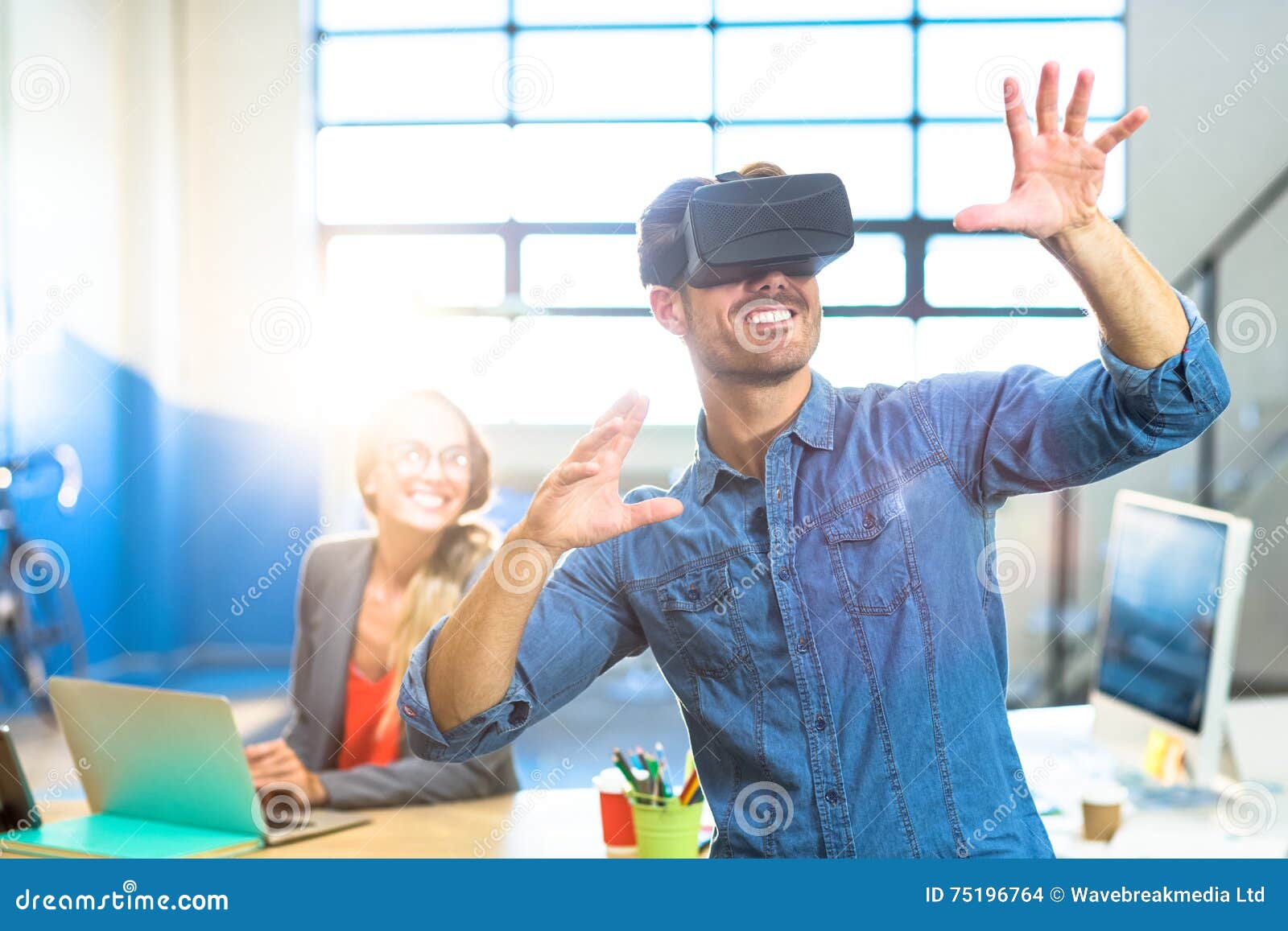 Male Graphic Designer Using the Virtual Reality Headset Stock Photo ...