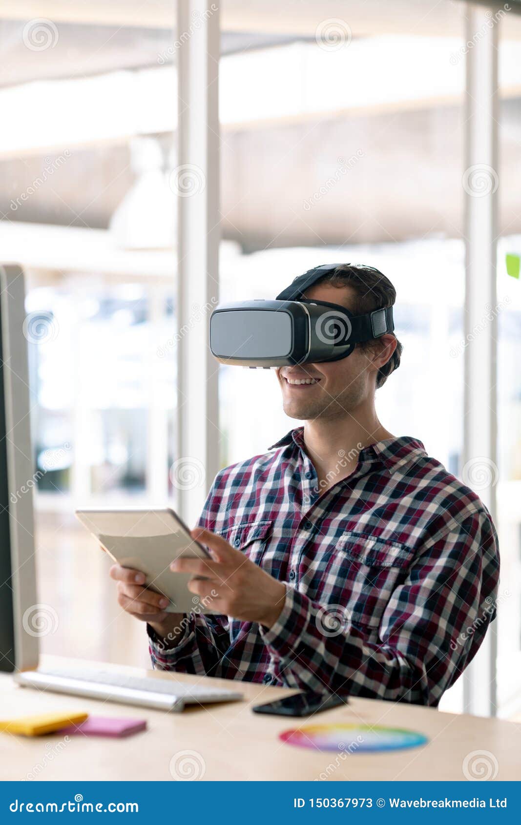 Male Graphic Designer Using Virtual Reality Headset while Working on ...