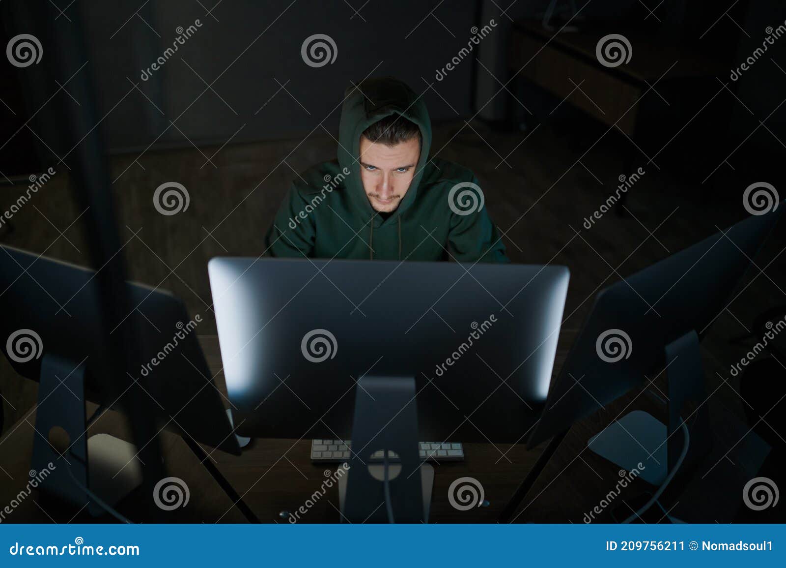 Male Hacker in Hood Works on Computer, Front View Stock Image - Image ...