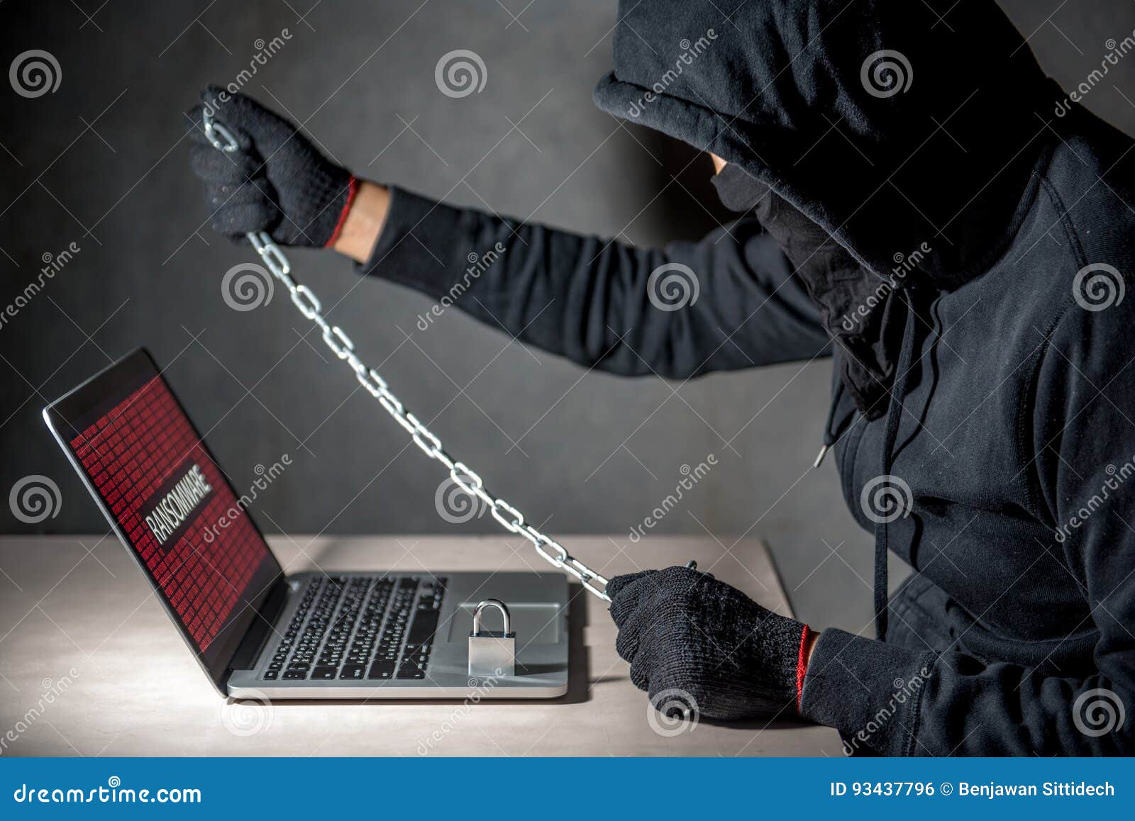 Male Hacker Locking Computer by Using Chain and Padlock Stock Photo ...