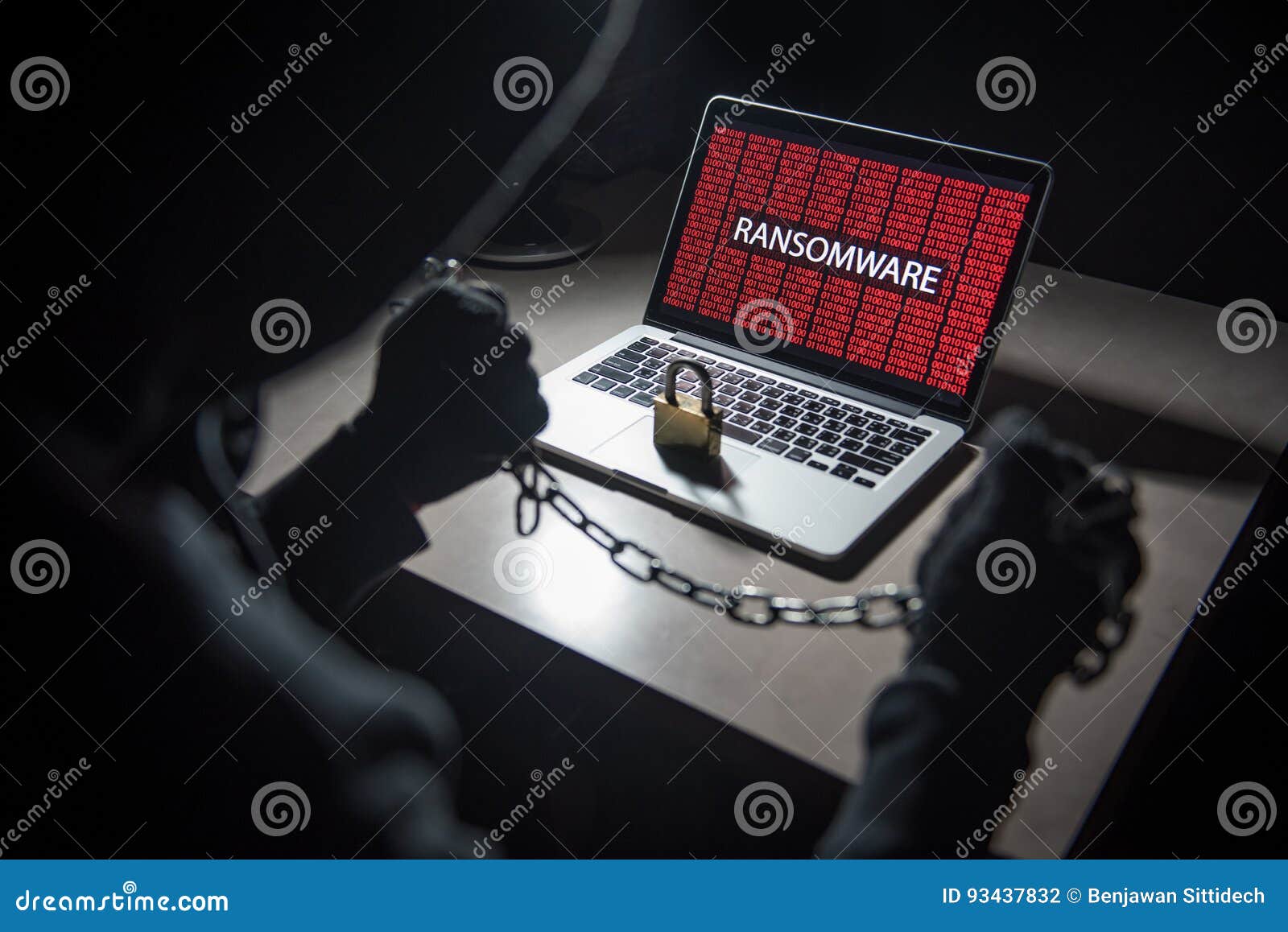 Male Hacker Locking Computer by Using Chain and Padlock Stock Photo ...